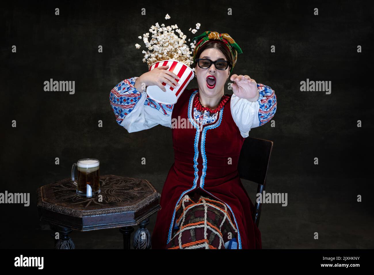 Screamer. Shocked beautiful Ukrainian woman wearing traditional folk ...