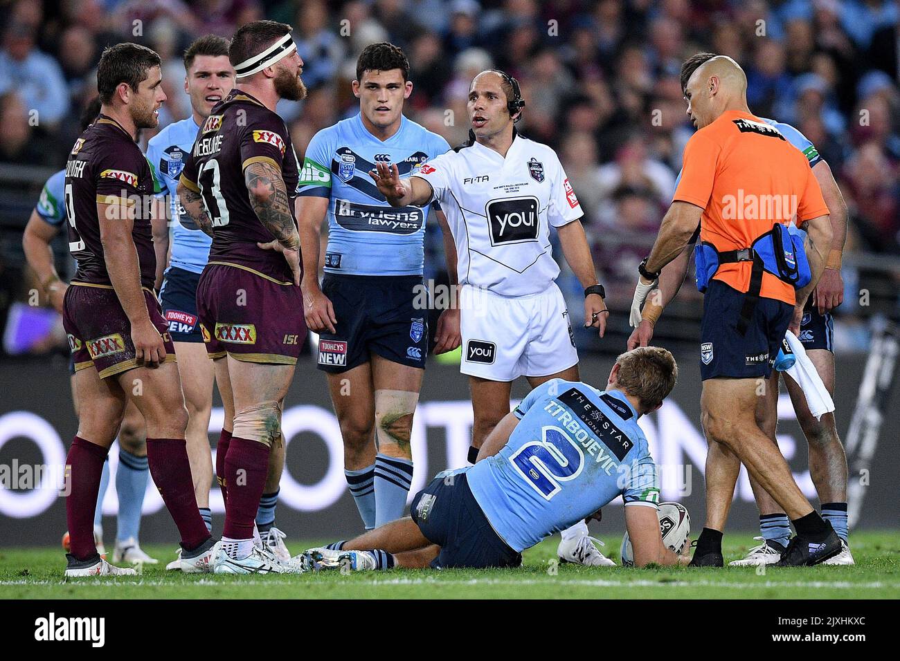 Referee Ashley Klein gestures to Josh McGuire of the Maroons following ...