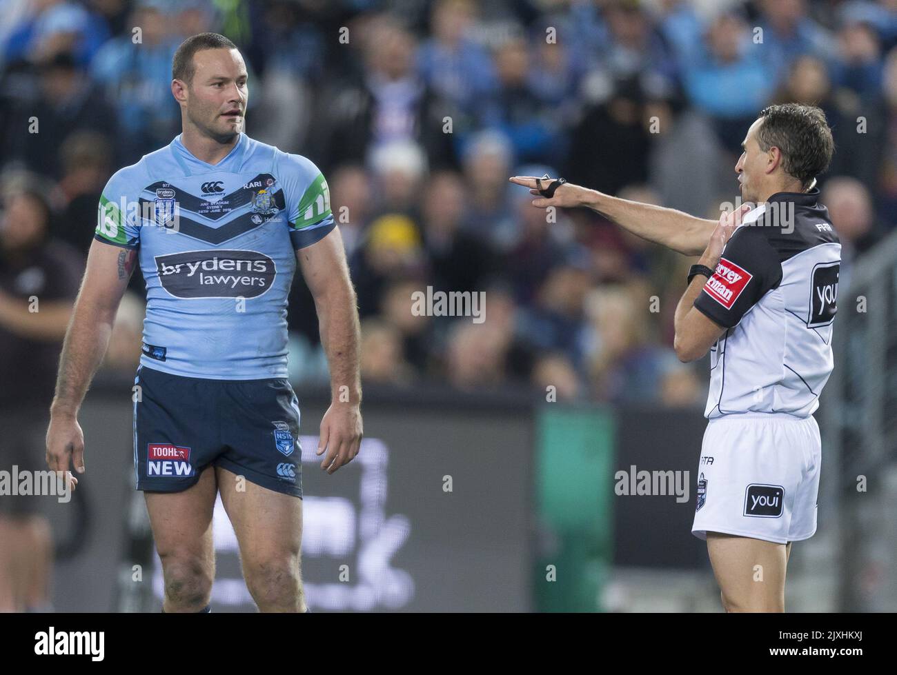 Boyd Cordner of the Blues (left) complains to referee Gerard Sutton ...