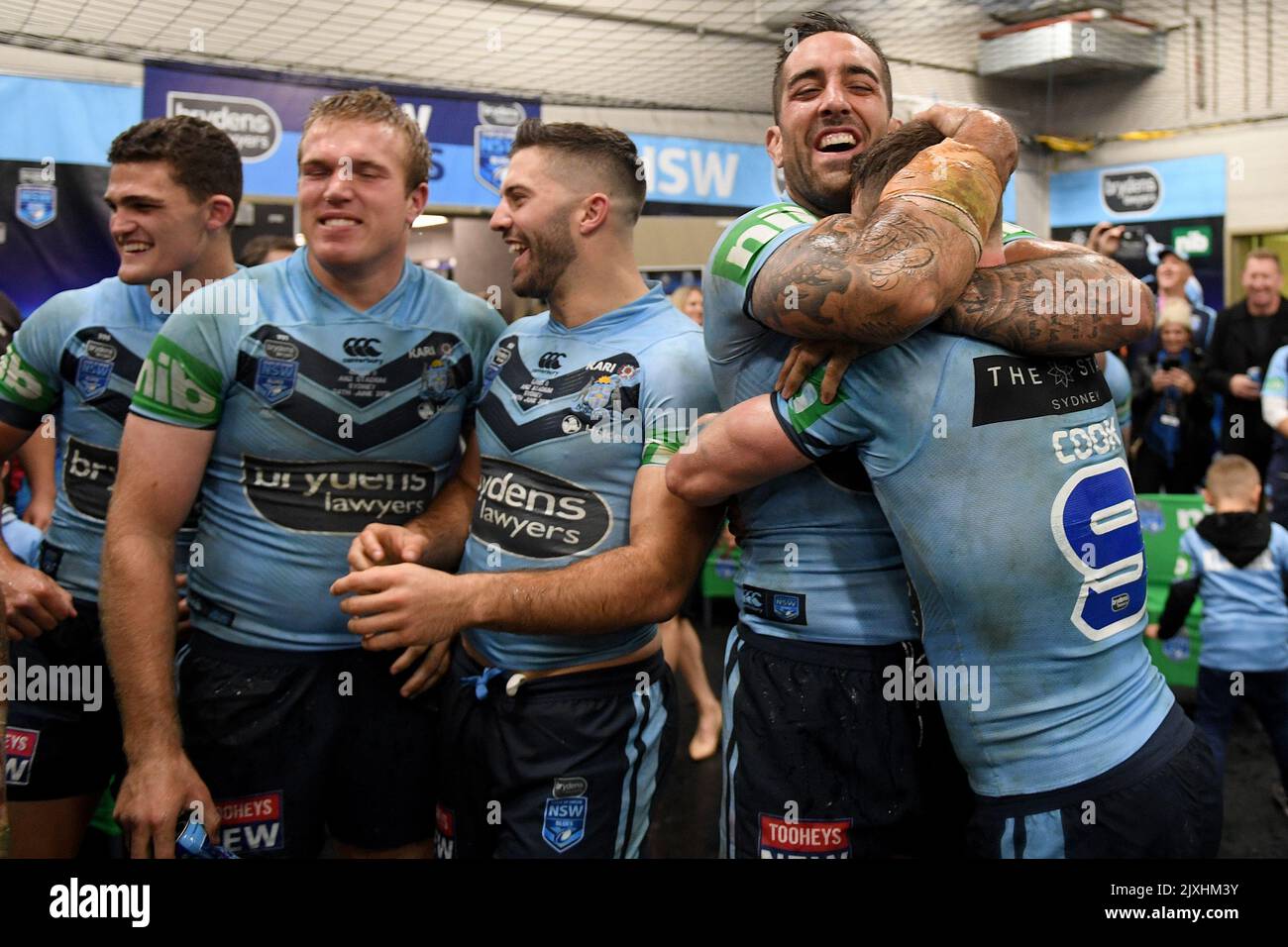 Blues players celebrate in the change rooms following their win over ...
