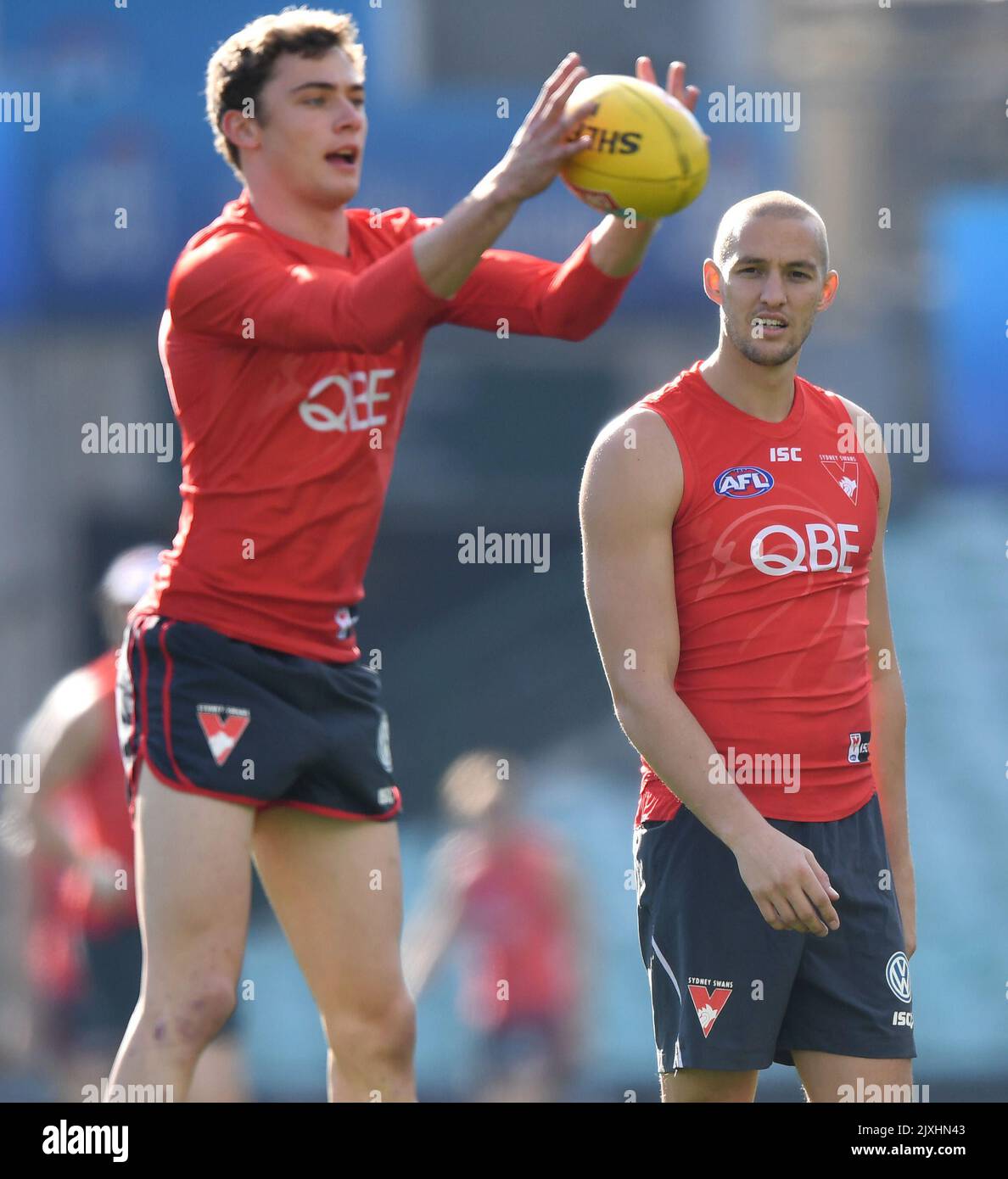 Sam Reid of the Sydney Swans (right) during a team training session at ...