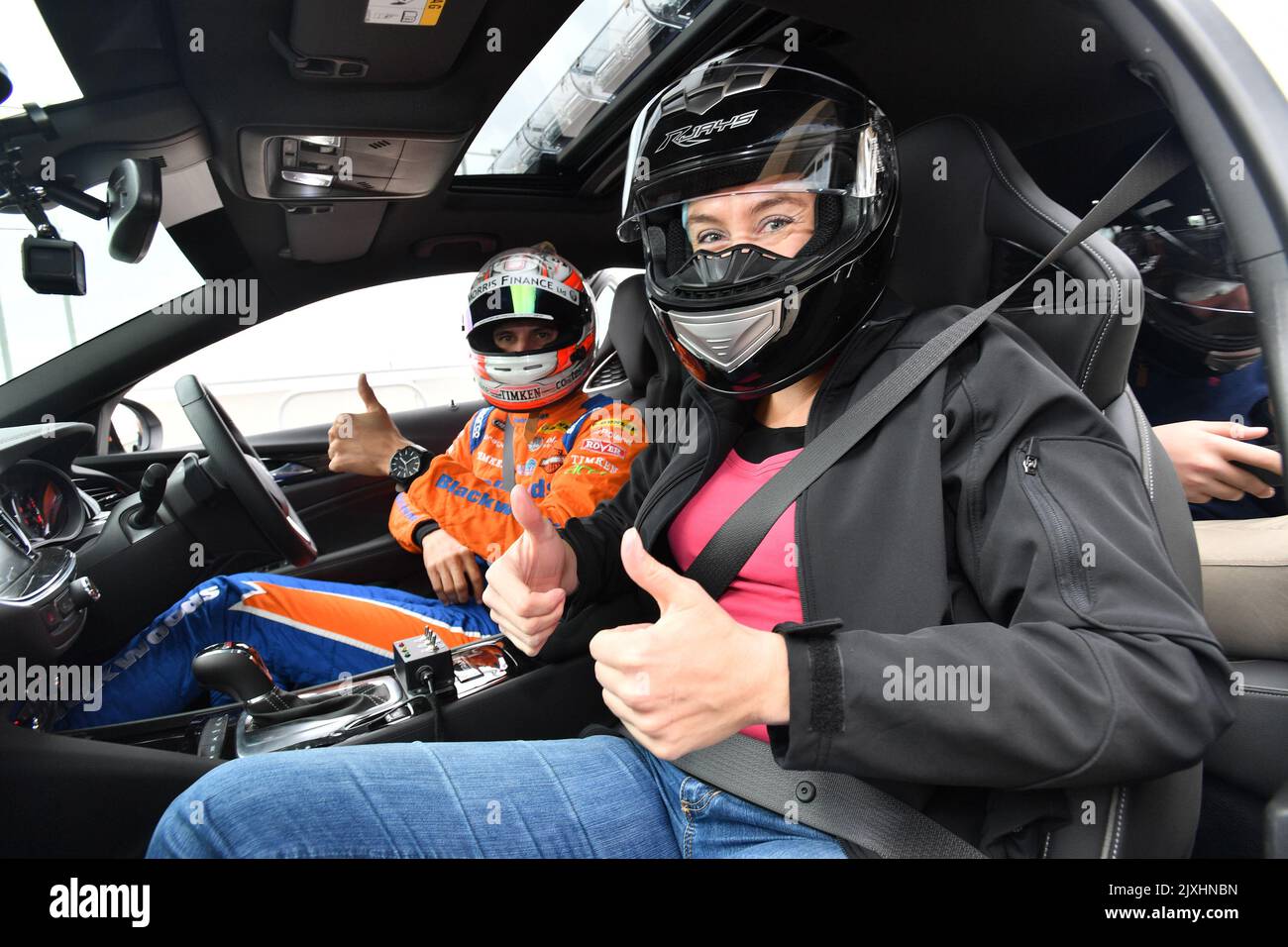 Nick Percat from Brad Jones Racing and journalist Cara Jenkins are seen ...
