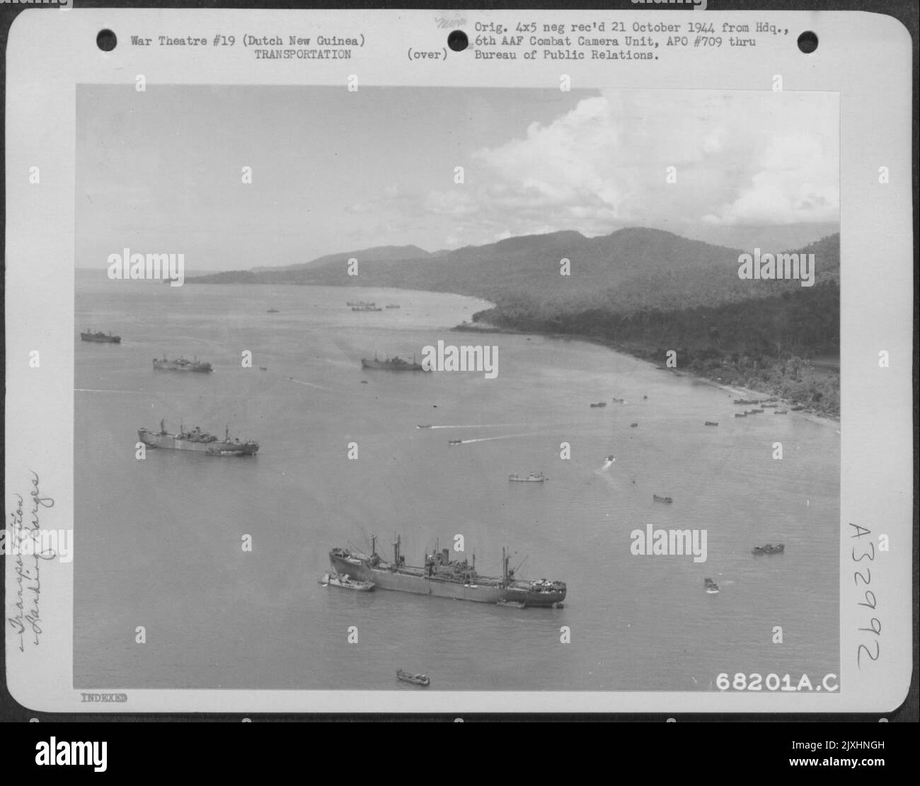 The shore line of Cape Sansapor, Dutch New Guinea, is a beehive of ...