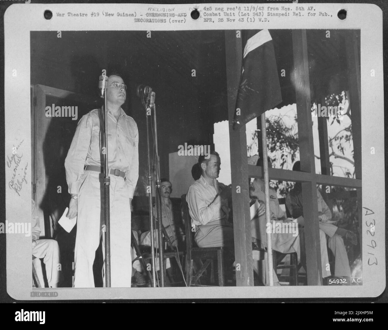 Protestant Chaplain speaking at dedication of new chapel in New Guinea ...