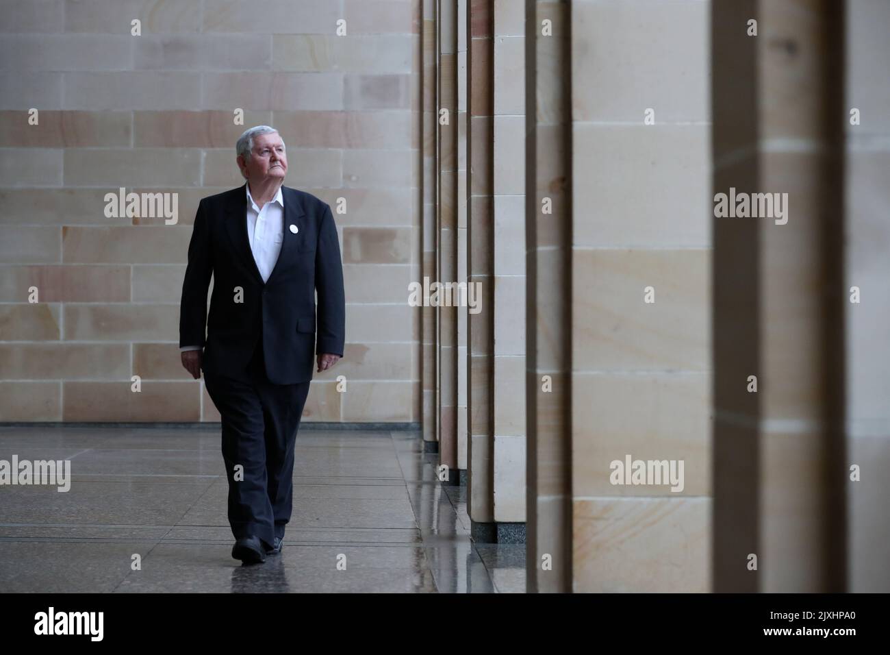 Abuse survivor John Ryall poses for a photograph outside the Parliament ...
