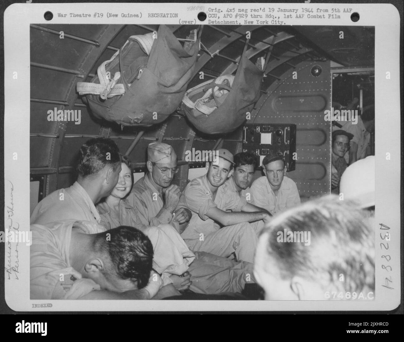 Gary Cooper and party aboard a Douglas C-47 enroute to Port Moresby ...
