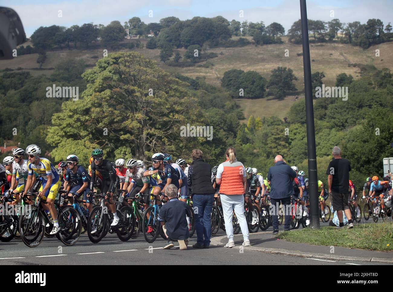 The peloton passes through the village of Sleights near Whitby during ...