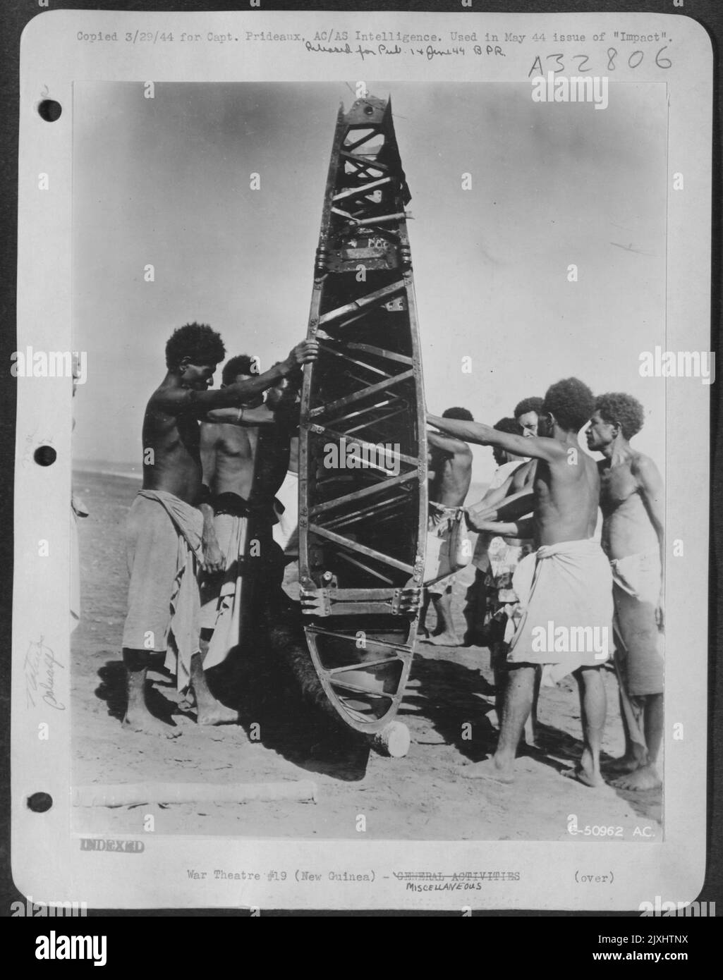 Strong arms of natives balance Japaneseanese Aichi 99 "Val" wing on ...