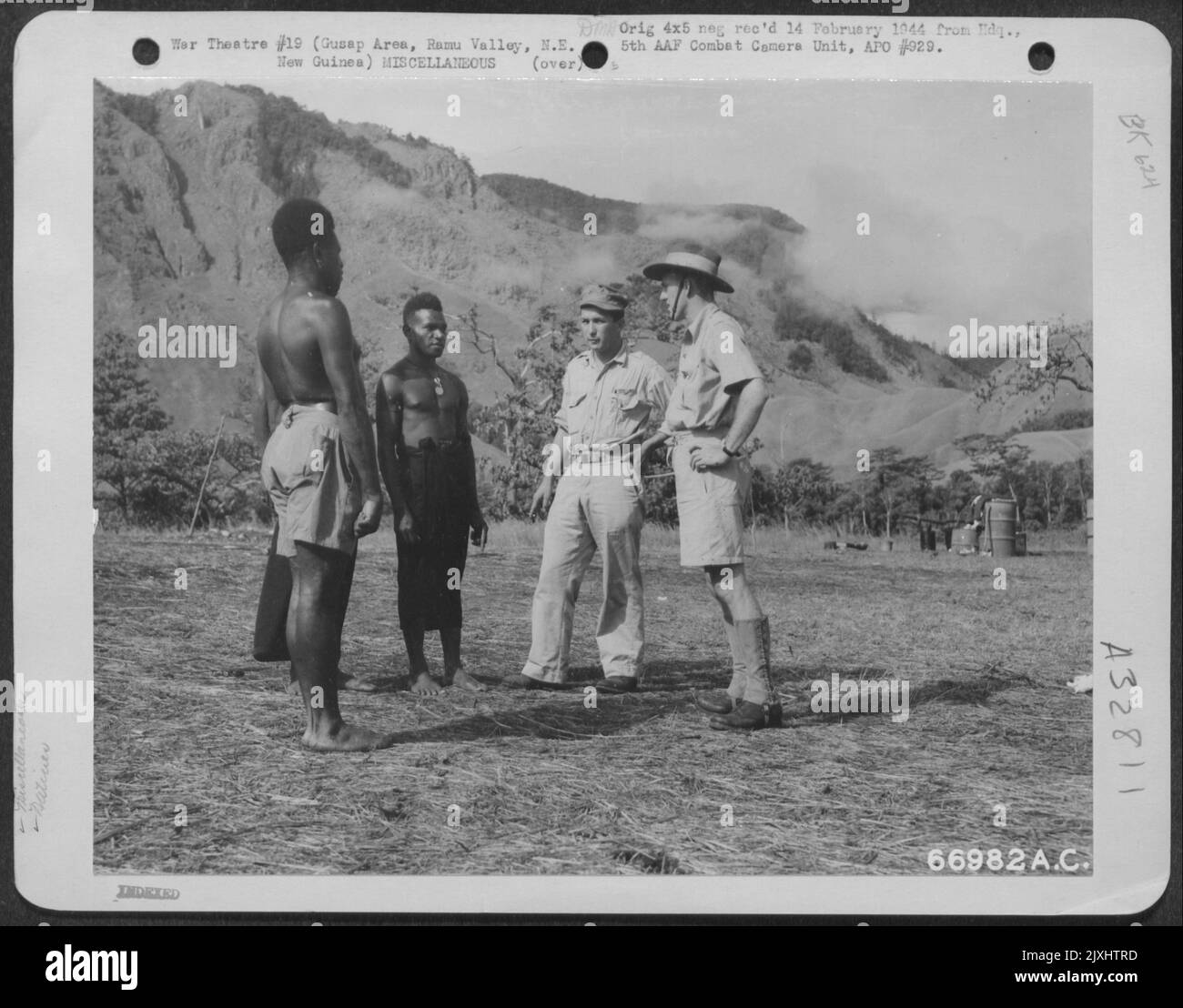 Engineering officer confering with Angou Warrant officer in regards to ...