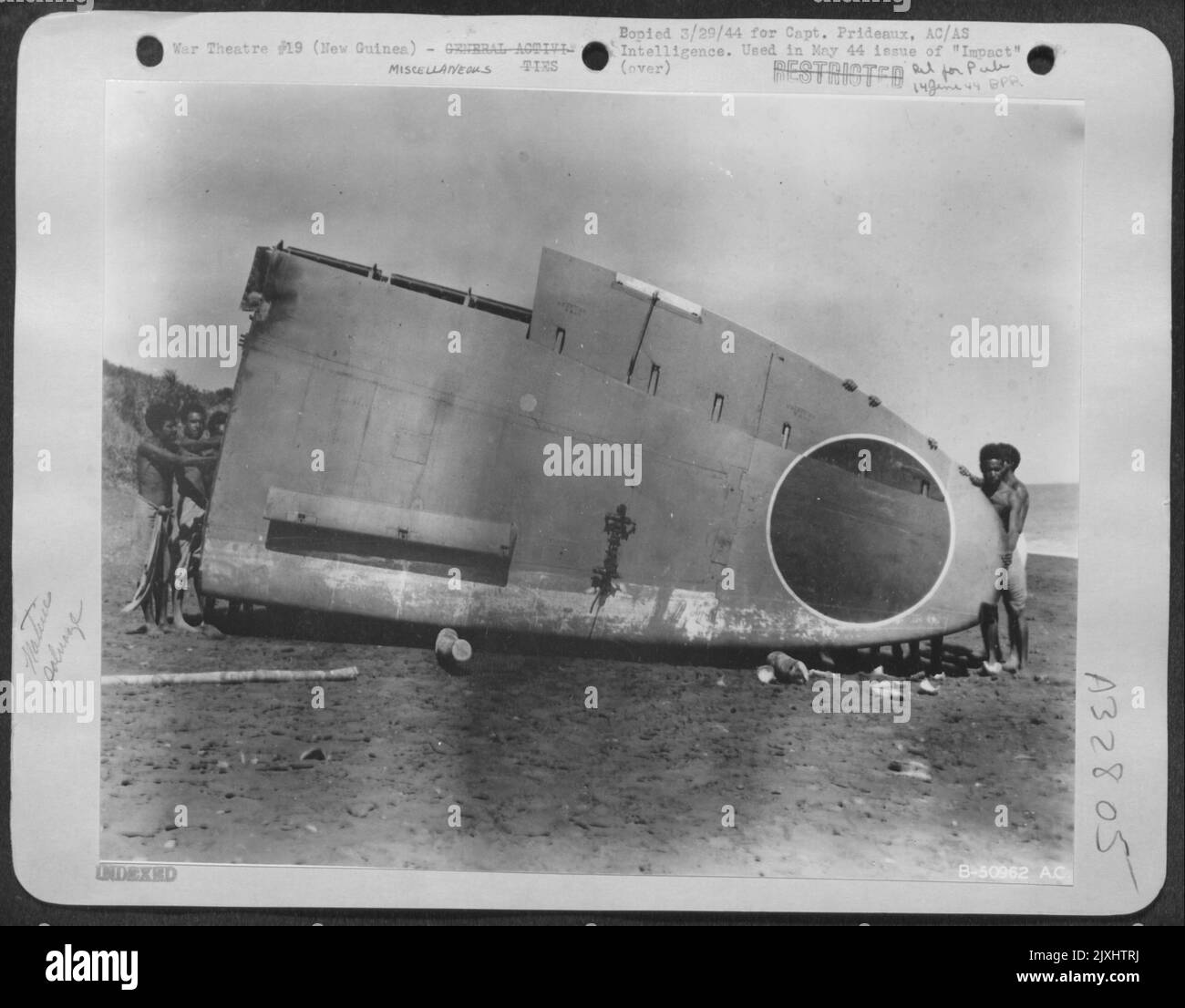 Natives (Bongs) move Aichi 99 "Val" on crude log rollers Stock Photo ...