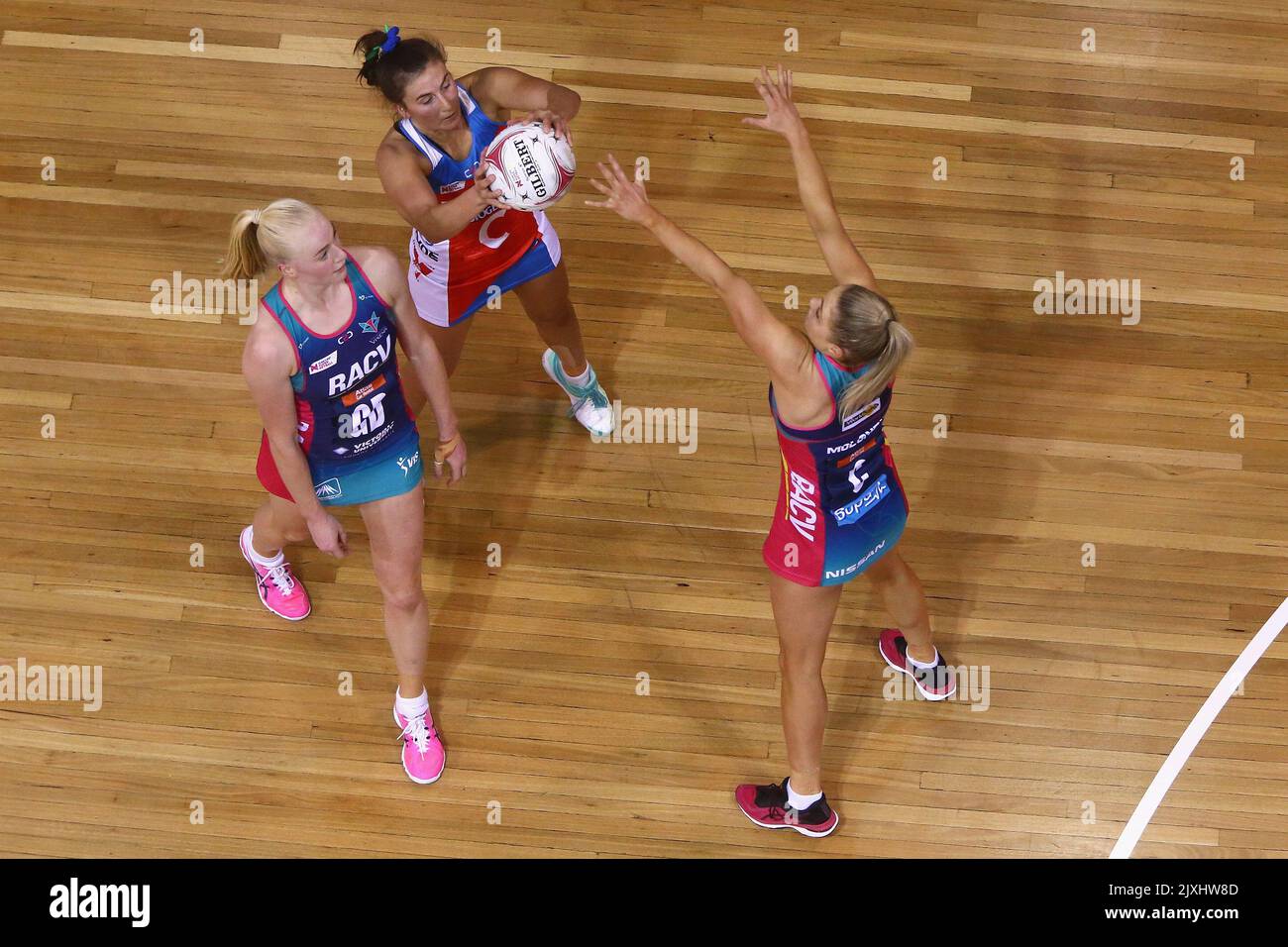 Maddy Proud of the Swifts looks for a pass during the Round 9 Super ...