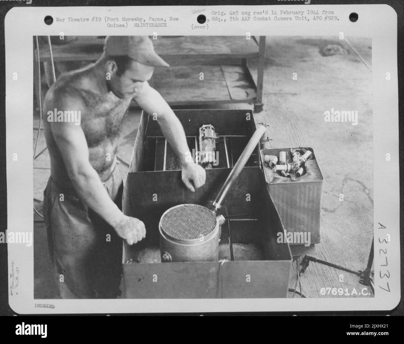 A "GI" of the 27th Air Depot Group at work in the oil temperature ...