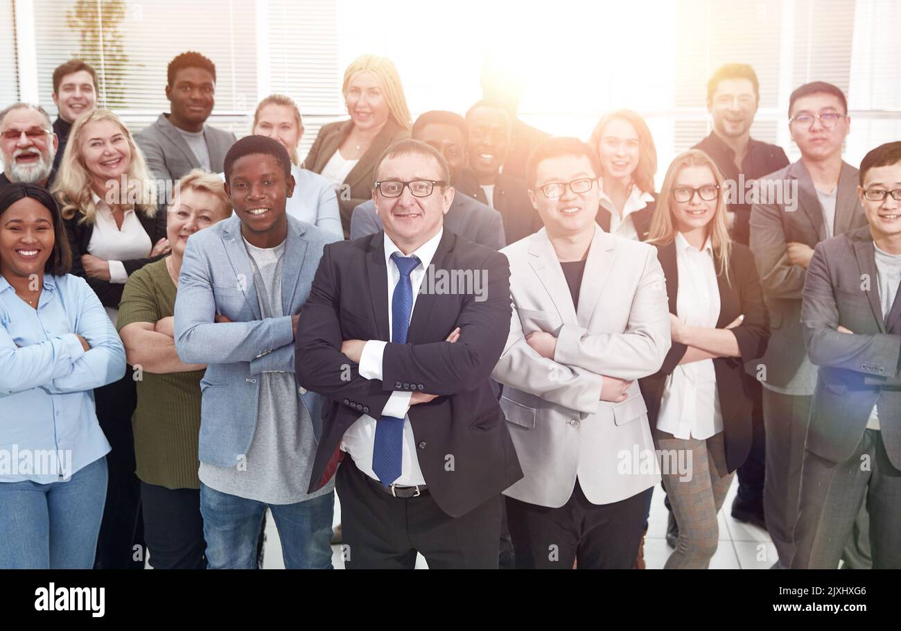 large group of diverse employees standing together Stock Photo - Alamy