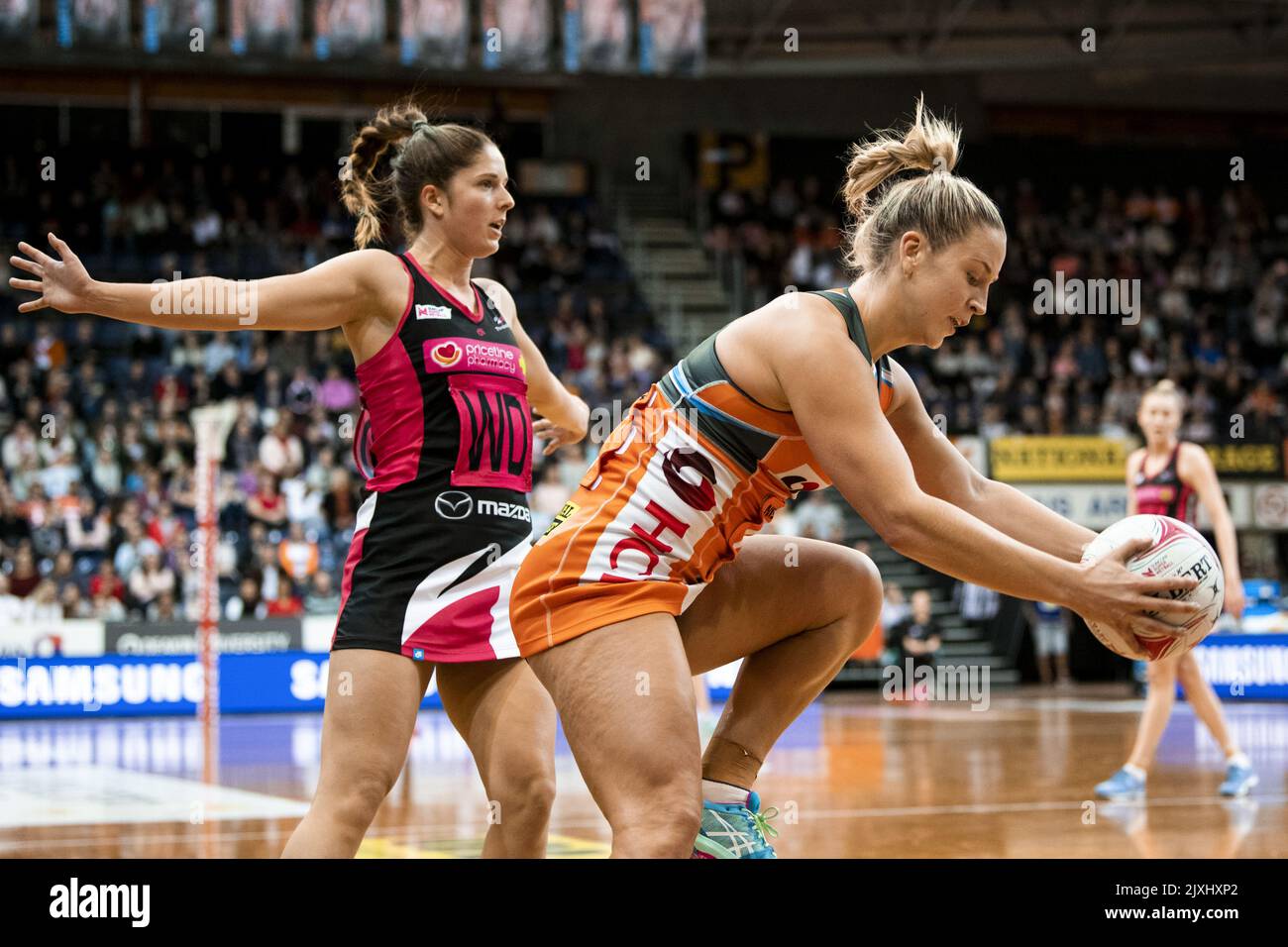 Jamie-Lee Price of the Giants (right) and Fiona Fowler of the ...