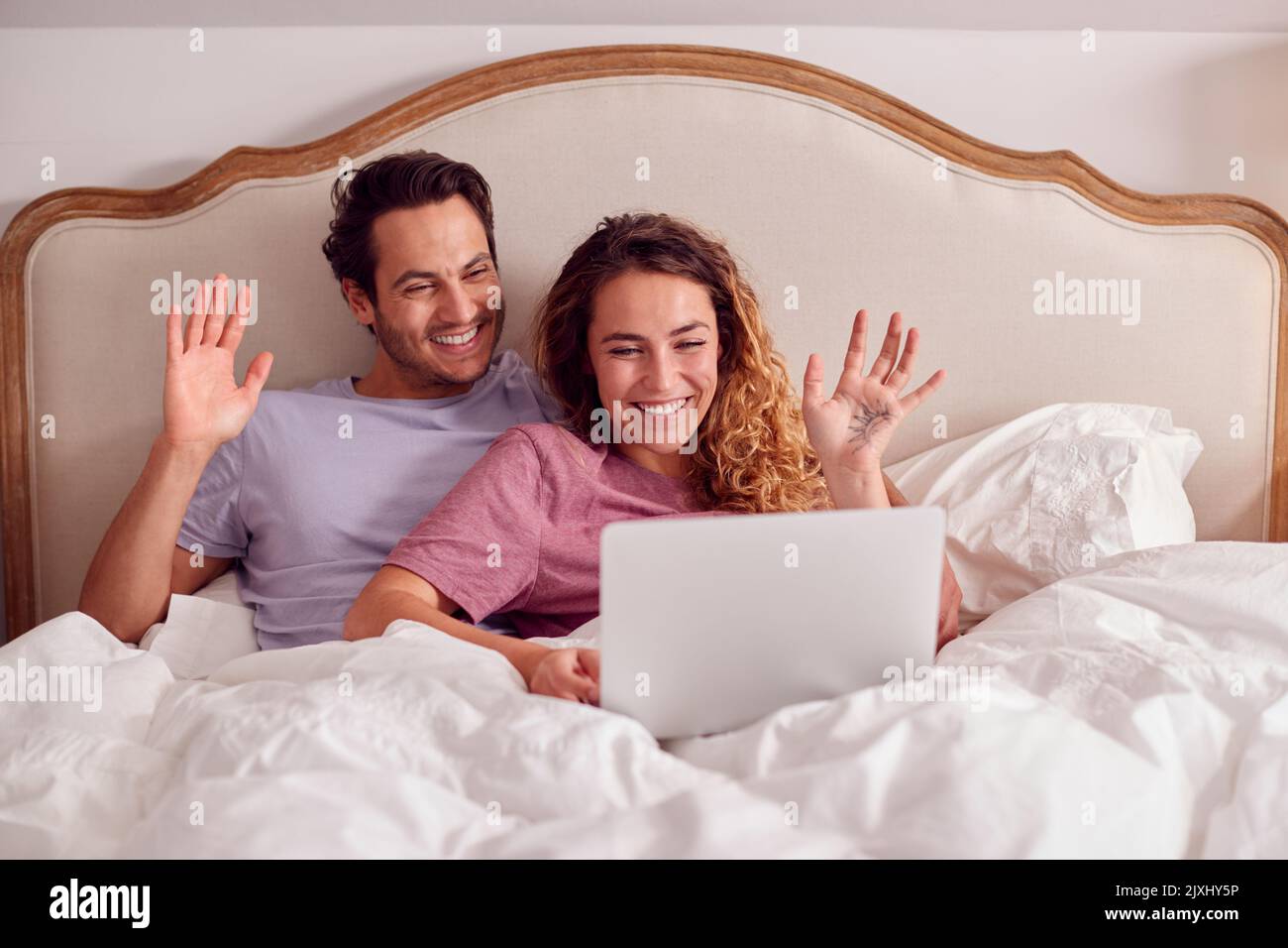 Person on bed making video call hi-res stock photography and images - Alamy