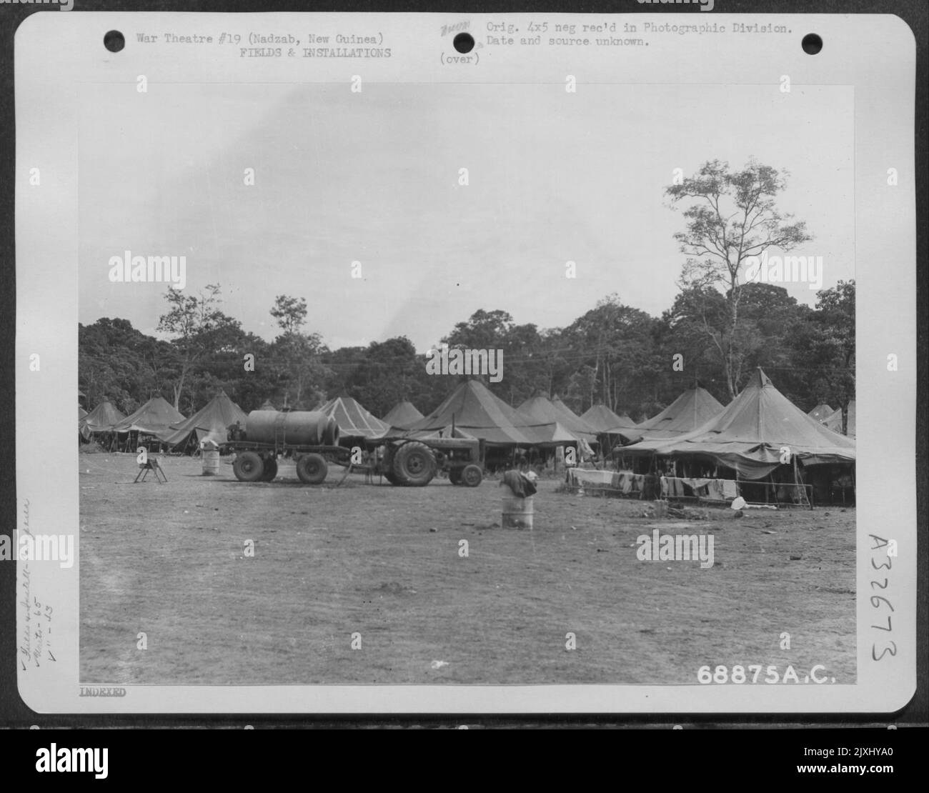 Enlisted men of the 65th Bomb Group, are assigned to these tents at an ...