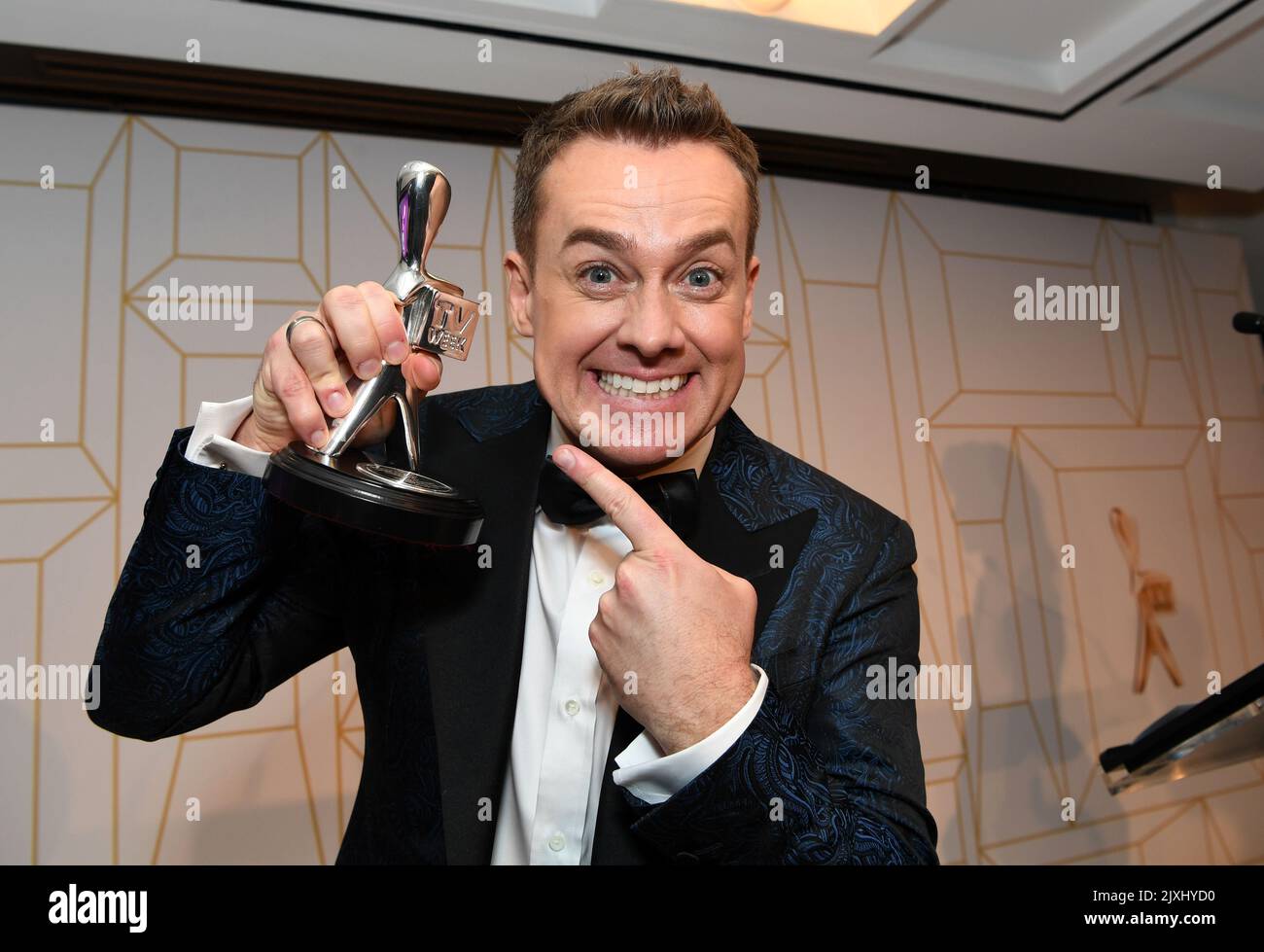 Grant Denyer poses with his Logie award for the most popular presenter ...