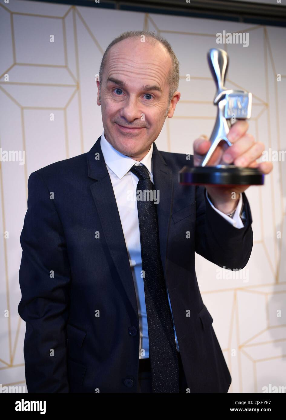 Tom Gleisner, presenter of Have You Been Paying Attention, poses with ...