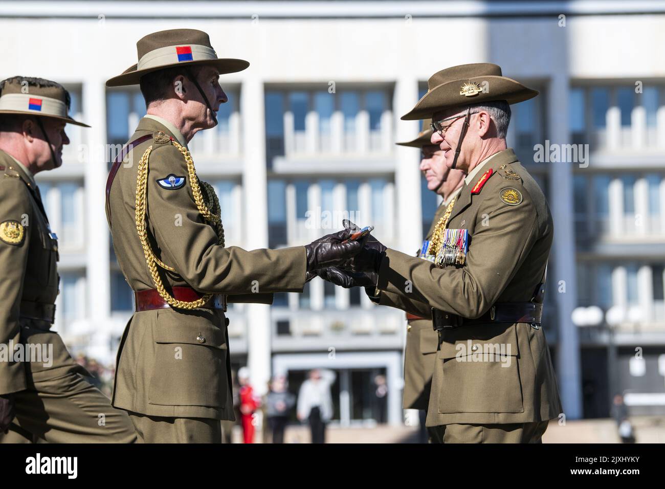 Lieutenant General Angus Campbell (left) hands over command of the ...