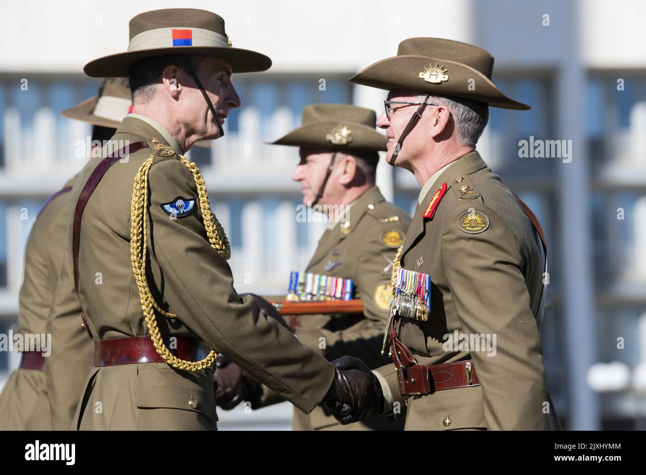 Lieutenant General Angus Campbell (left) hands over command of the ...