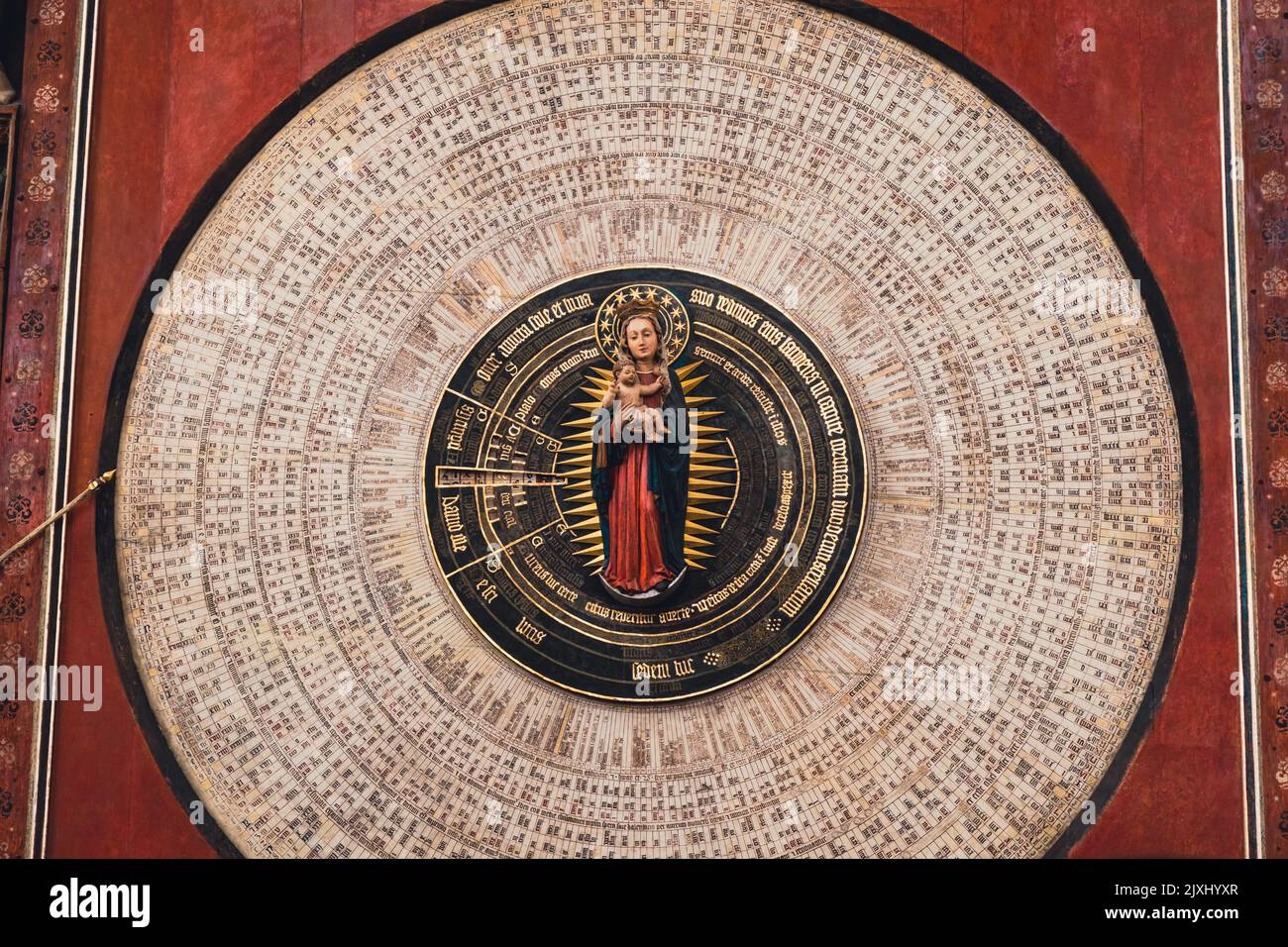 The medieval sun calendar on the red background in St Mary Cathedral ...