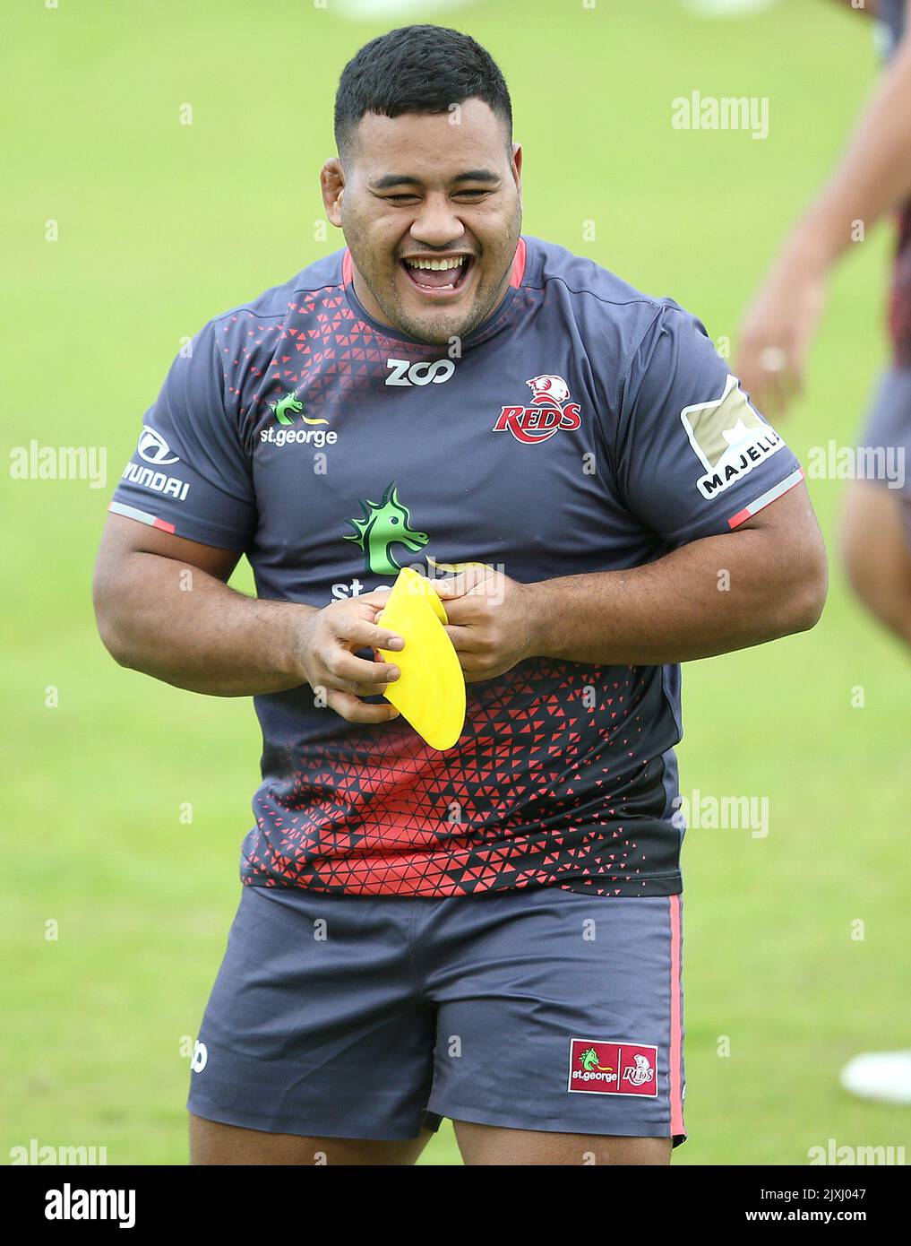 Queensland Reds player Taniela Tupou has a light moment during a team ...