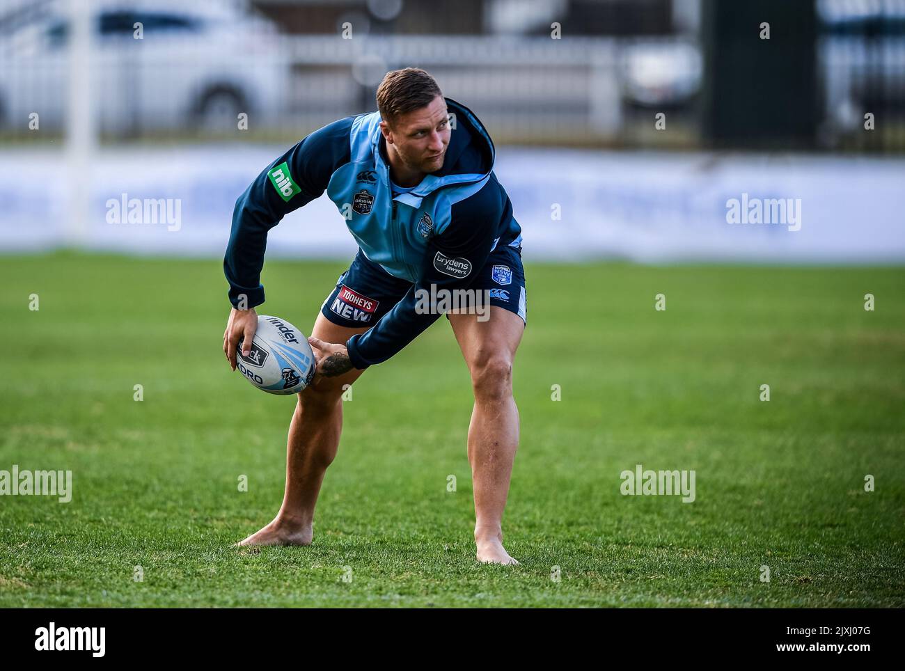 NSW Blues player Tariq Sims passes the ball during a team training ...