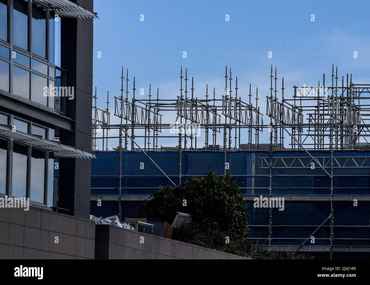 Construction Stock, Scaffold is seen on a building in Sydney, Tuesday ...