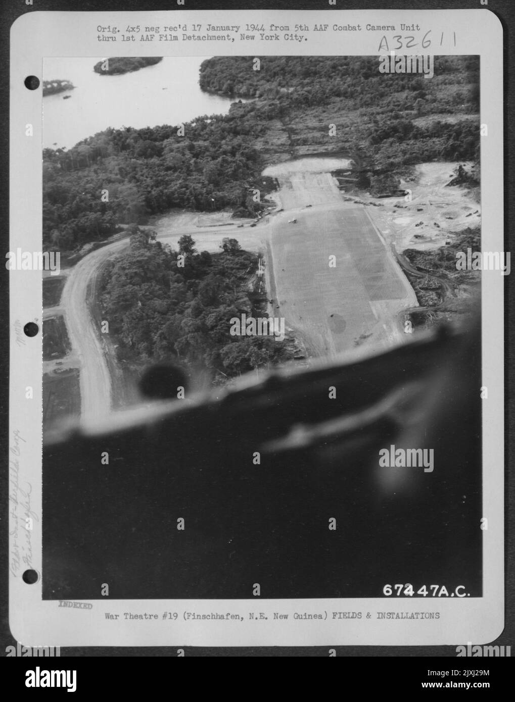 Aerial view of the north end of airstrip and taxiway at Finschhafen, N ...