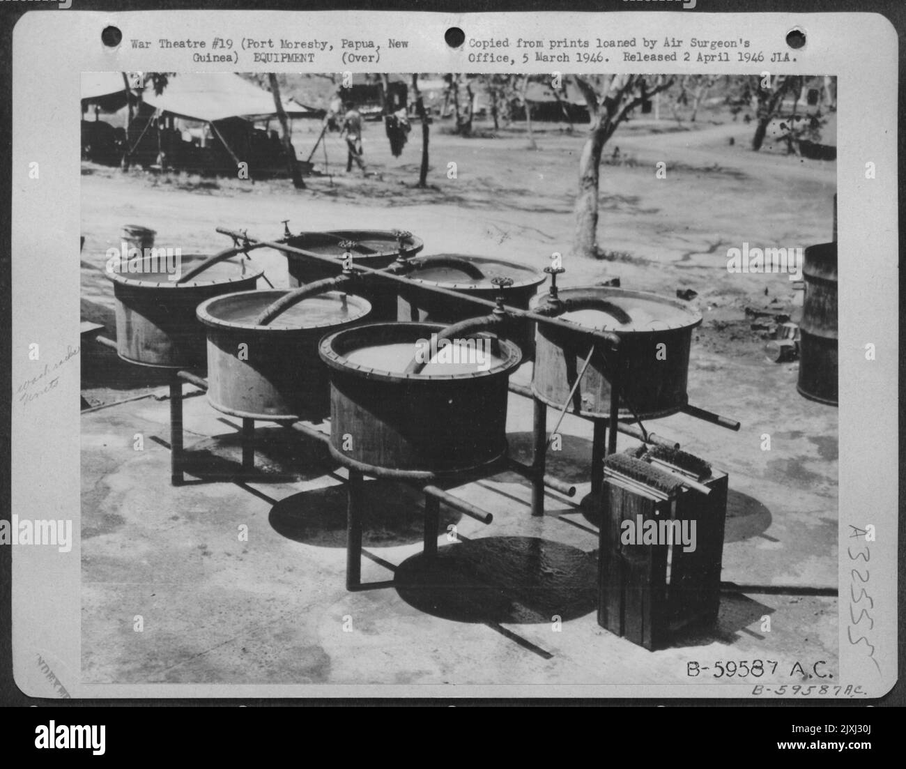 Steam heated wash rack of the 90th Bomb Gp. At Port Moresby, Papua, New ...