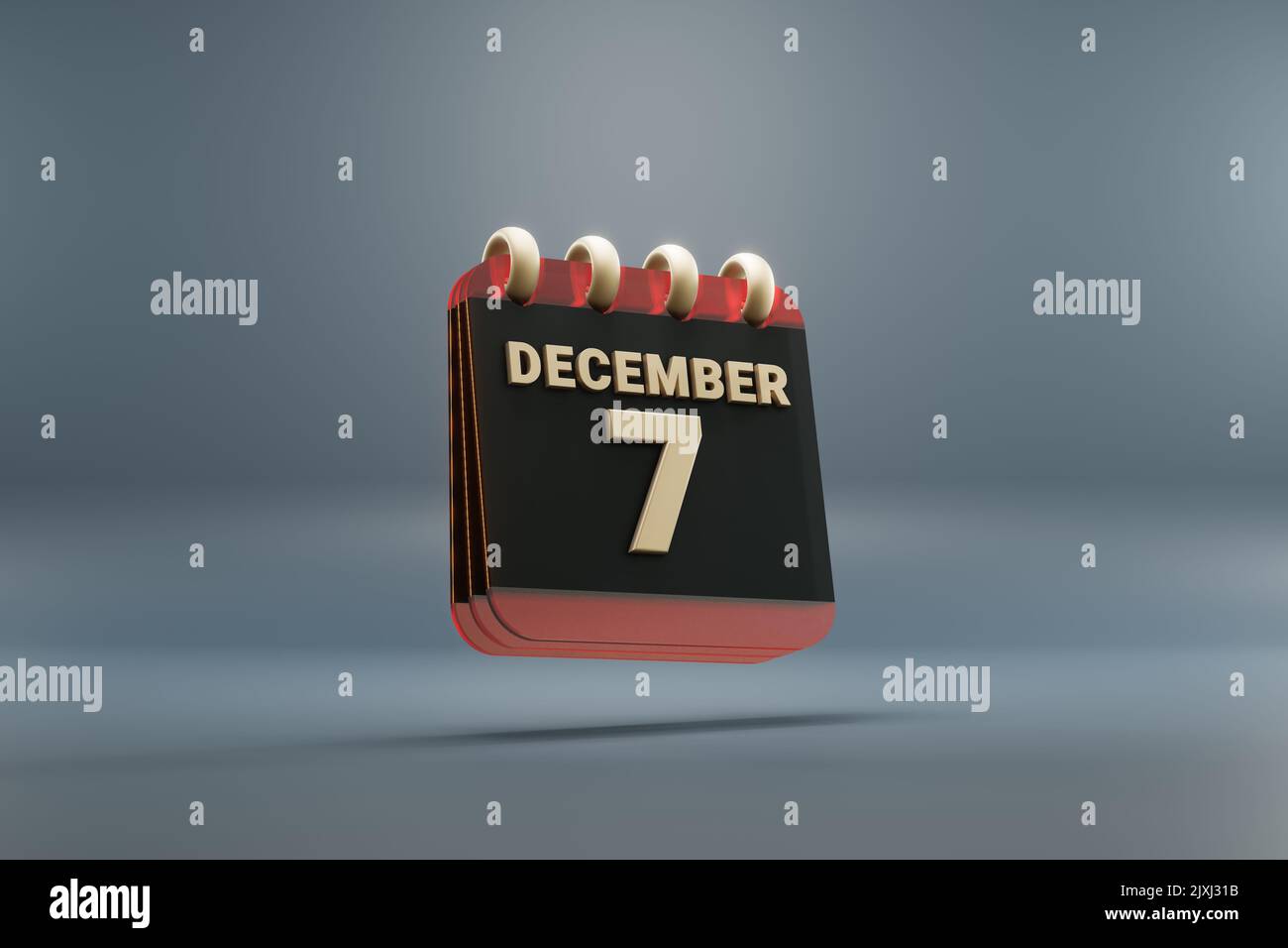 Standing black and red month lined desk calendar with date December 7 ...