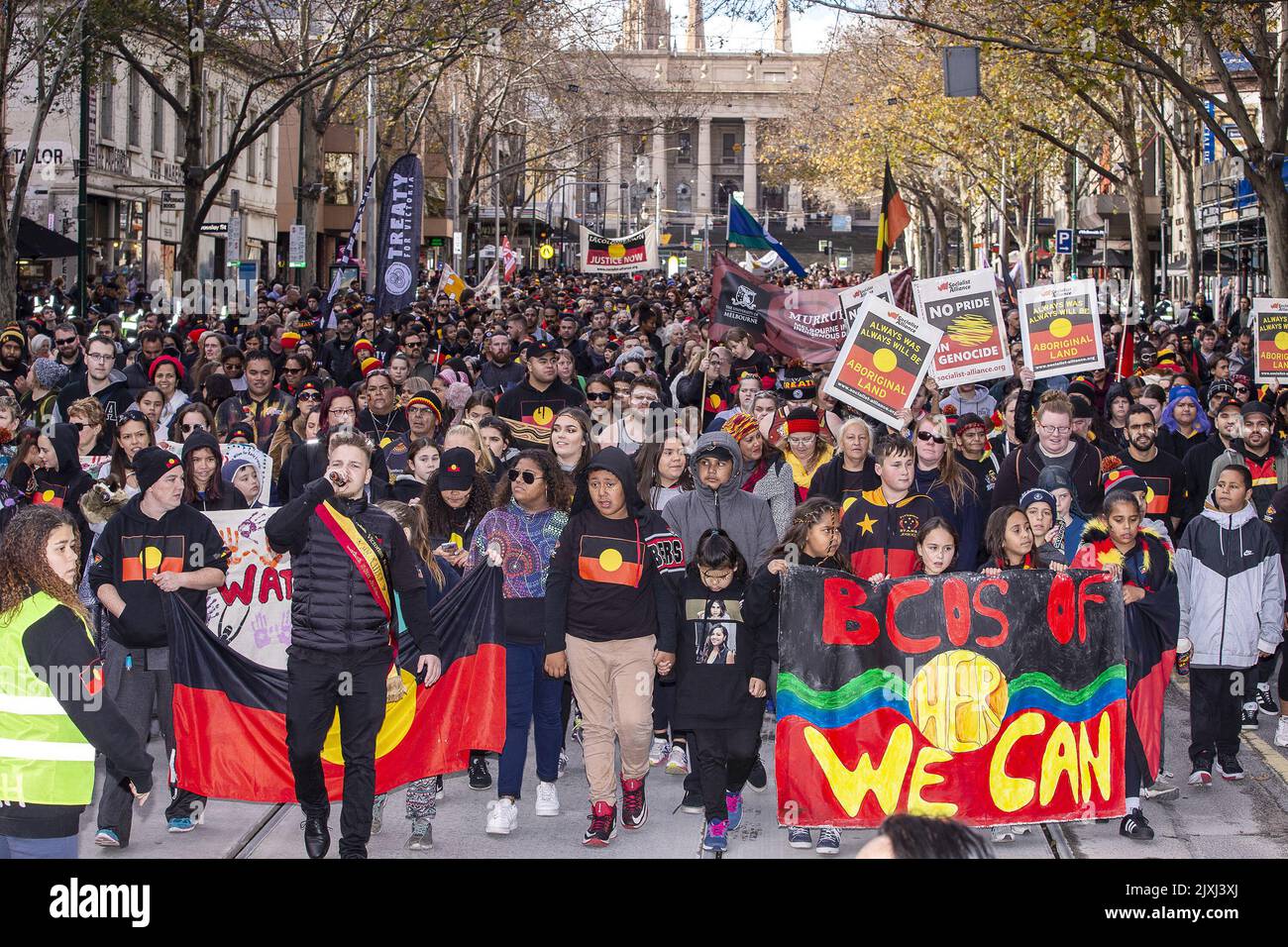 People participate in a NAIDOC week march in Melbourne, Friday, July 6 ...