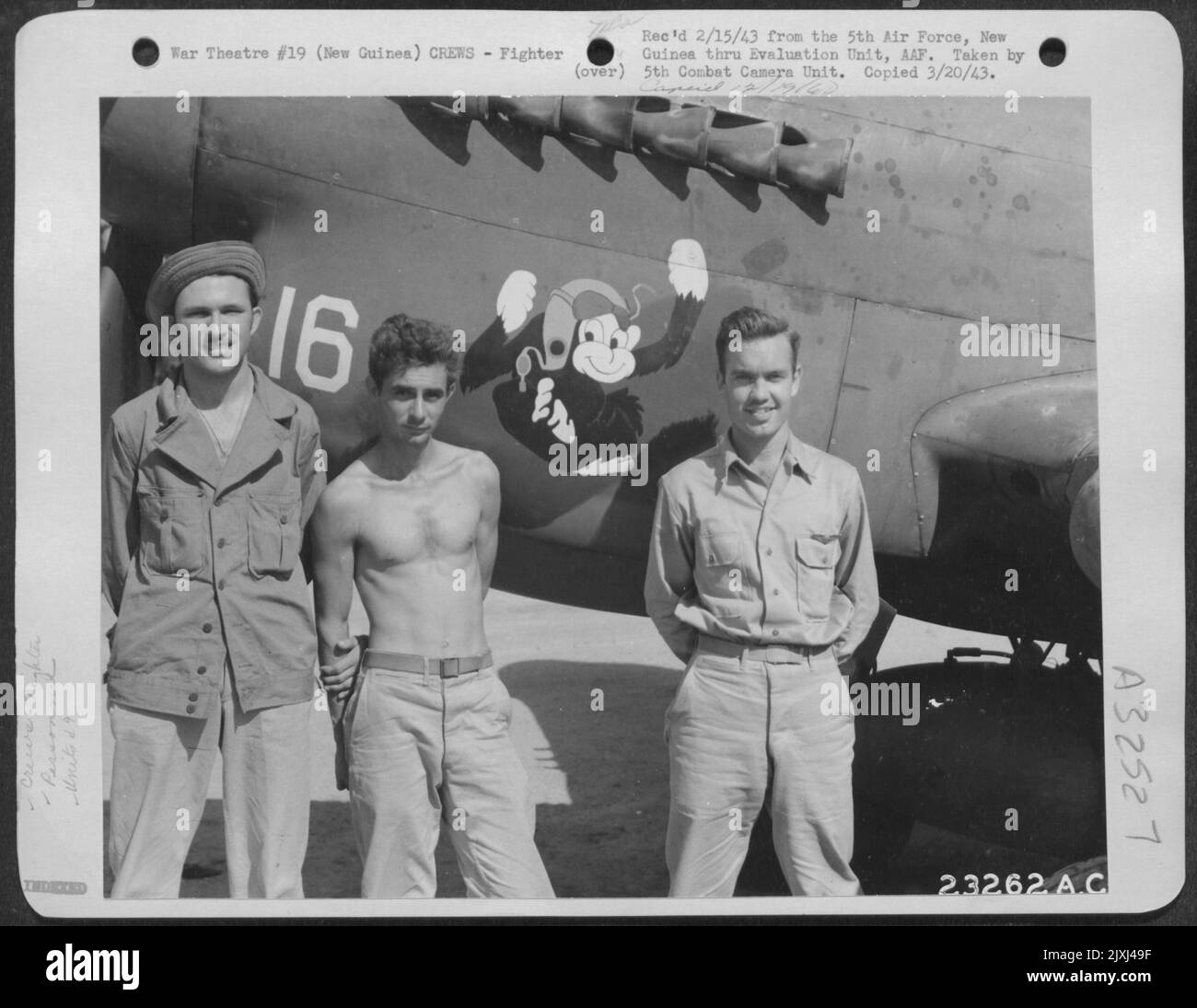 Pilot Clyde Knisley and crew of the 49th Fighter Group pose beside a ...