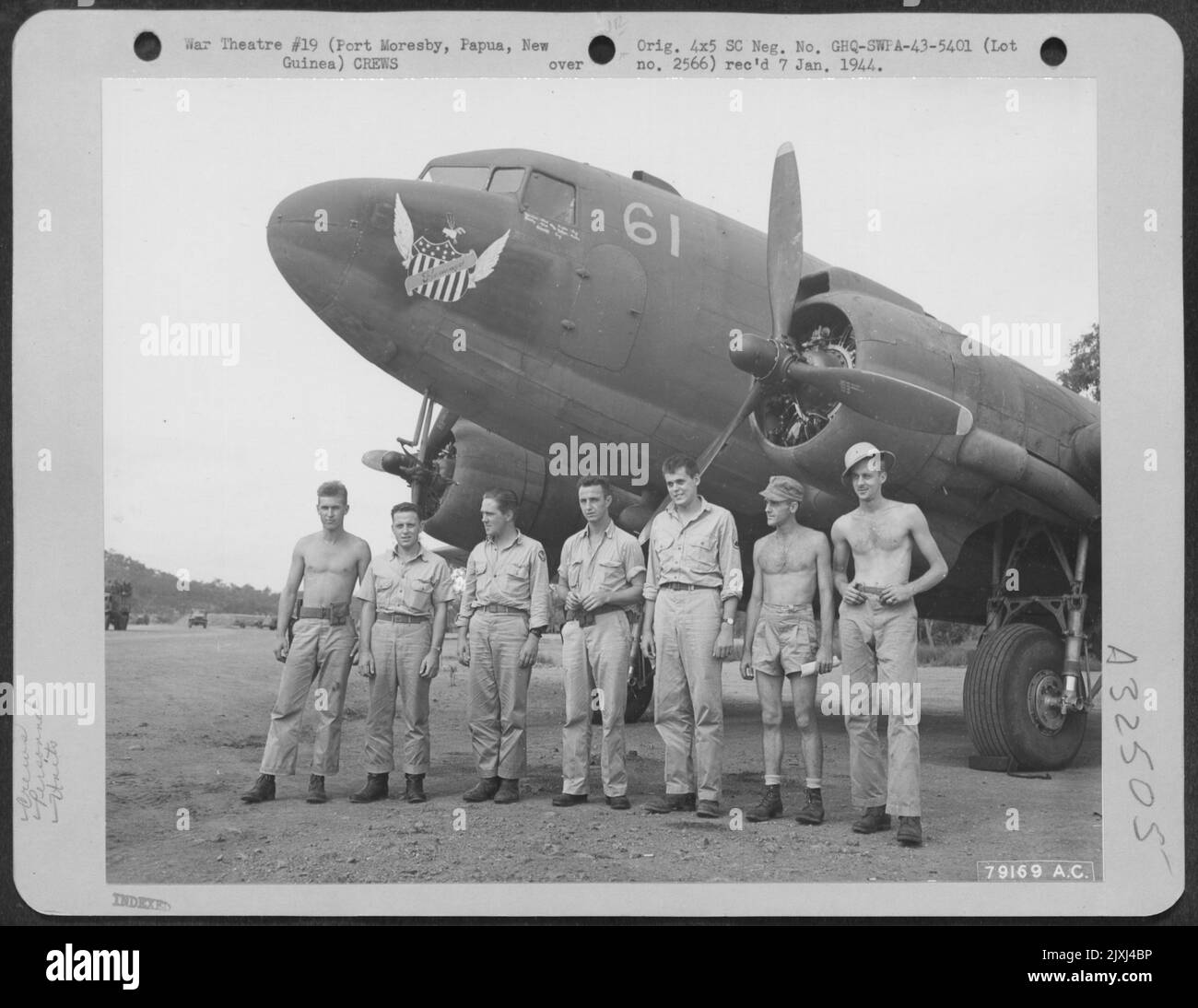 C-47 transport plane and its crew from 6th Troop Carrier Sq. 5th Air ...