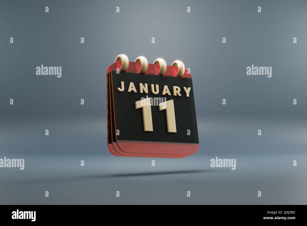 Standing black and red month lined desk calendar with date January 11 ...