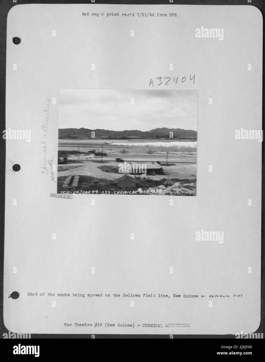 Shot of the smoke being spread on the Bellows Field line, New Guinea by ...