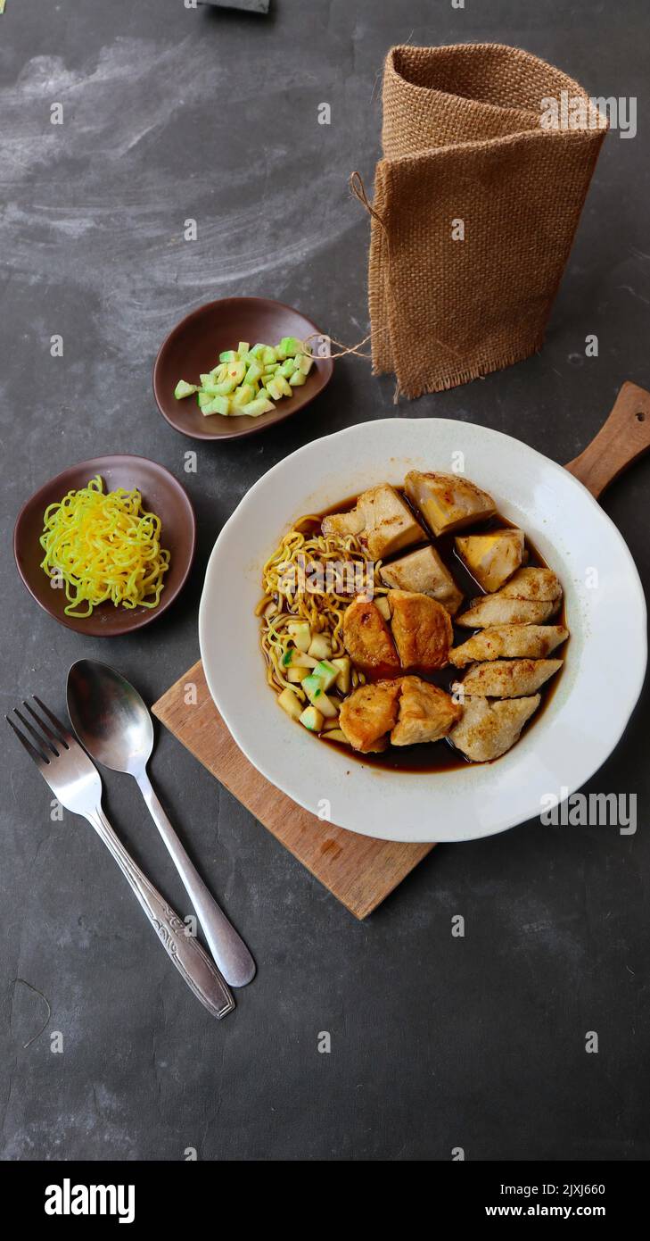 Pempek or empek-empek or fish cake is a food made from soft ground fish ...