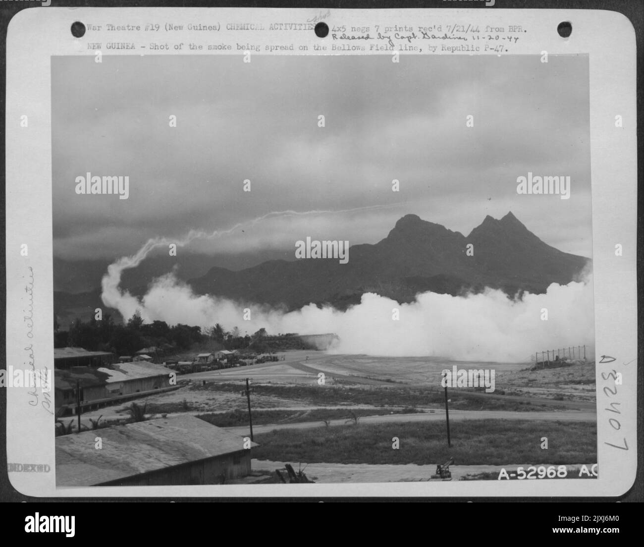 NEW GUINEA-Shot of the smoke being spread on the Bellows Field line, by ...