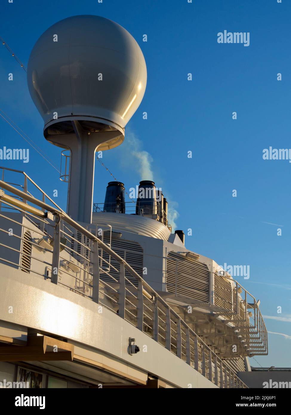 Looking up from the sun deck at the superstructure of a cruise ship in ...