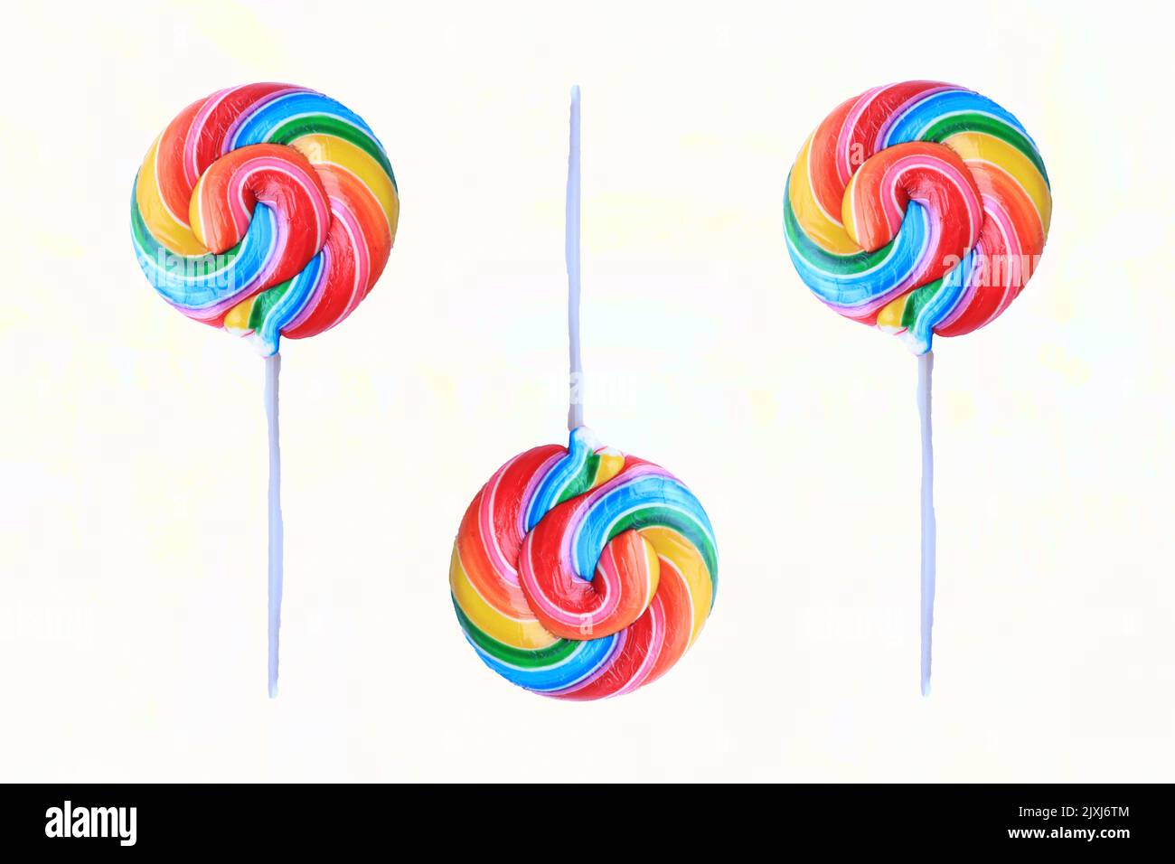 lollipop, Colorful rainbow lollipop swirl on plastic stick isolated on ...