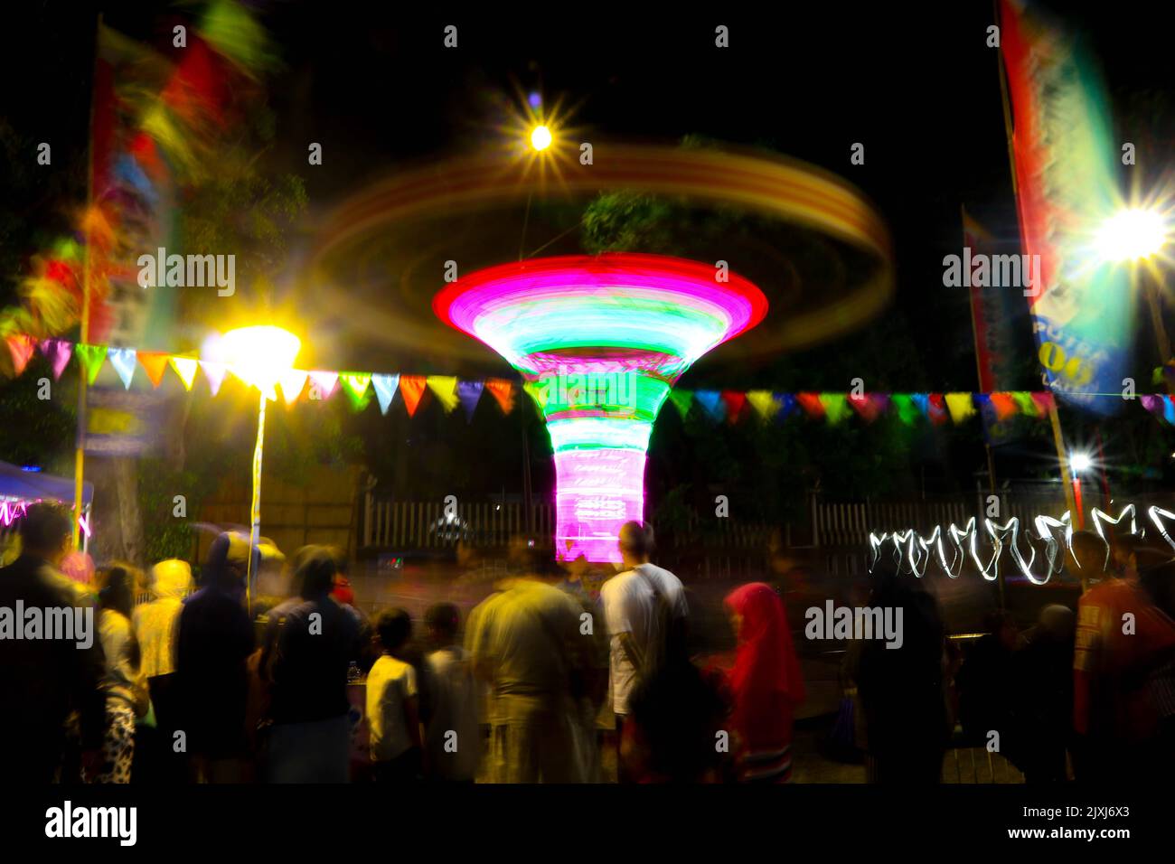 " Ferris wheel at night festival in slow motion photo. High Roller ...