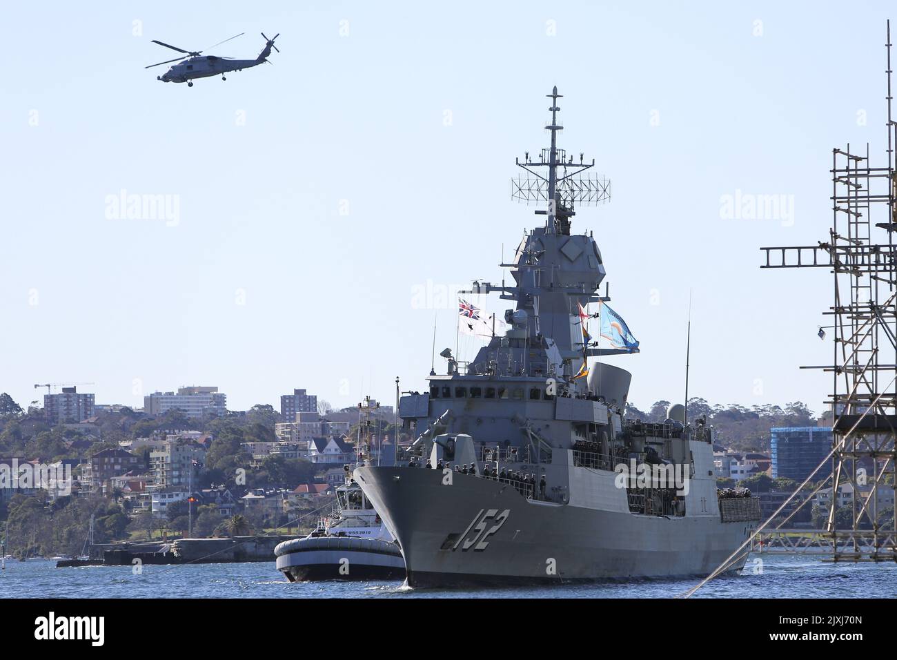 HMAS Warramunga and her crew as she arrives at Garden Island in Syndey ...