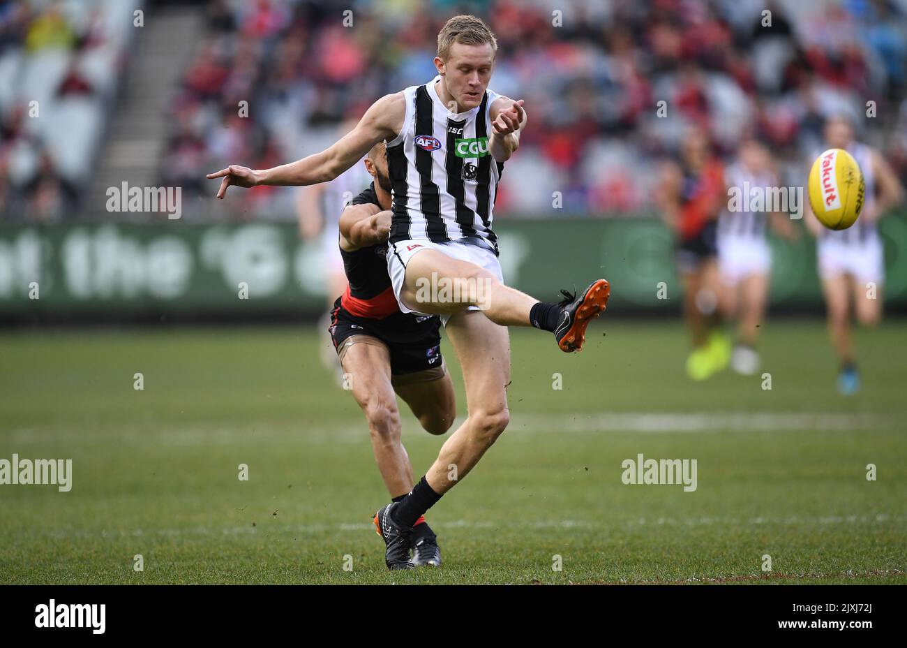 Jaidyn Stephenson of the Magpies (right) is seen in action during the ...