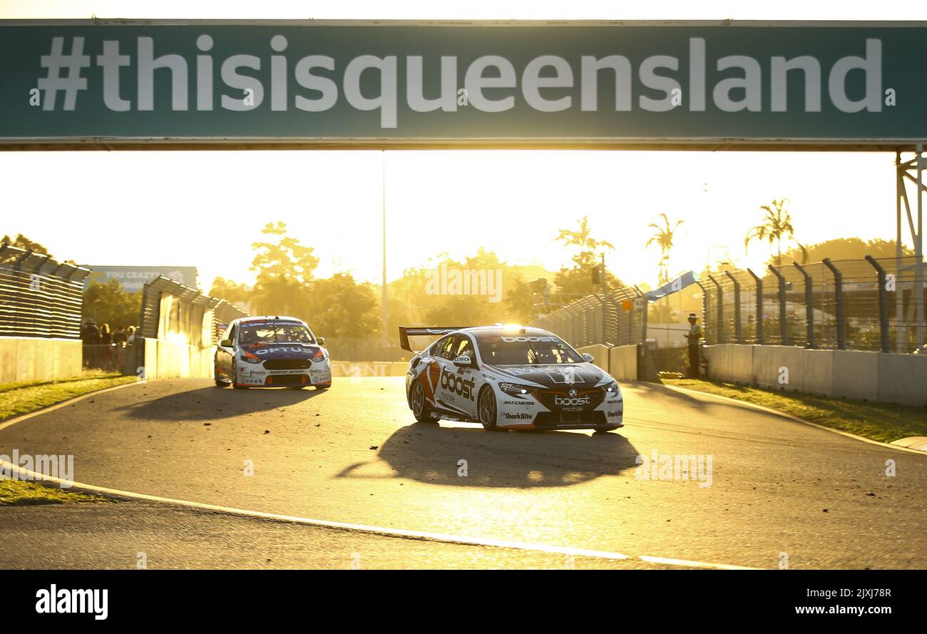 Scott Pye of Mobil 1 Boost Mobile Racing Team (right) leads from Todd ...