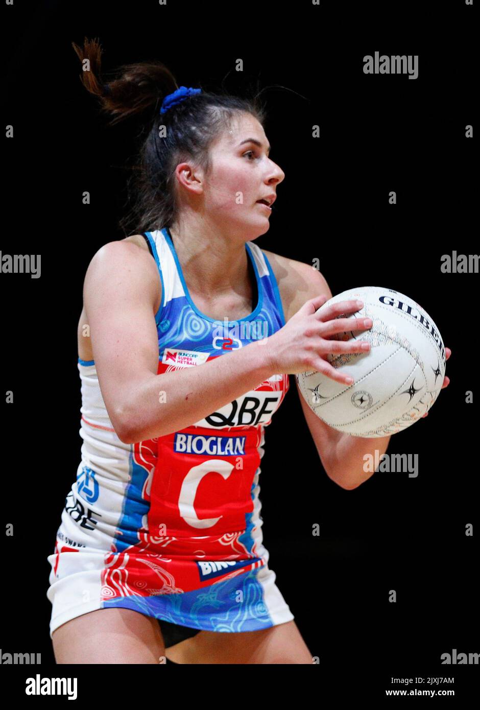 Maddy Proud of the Swifts looks for a pass during the Round 10 Super ...