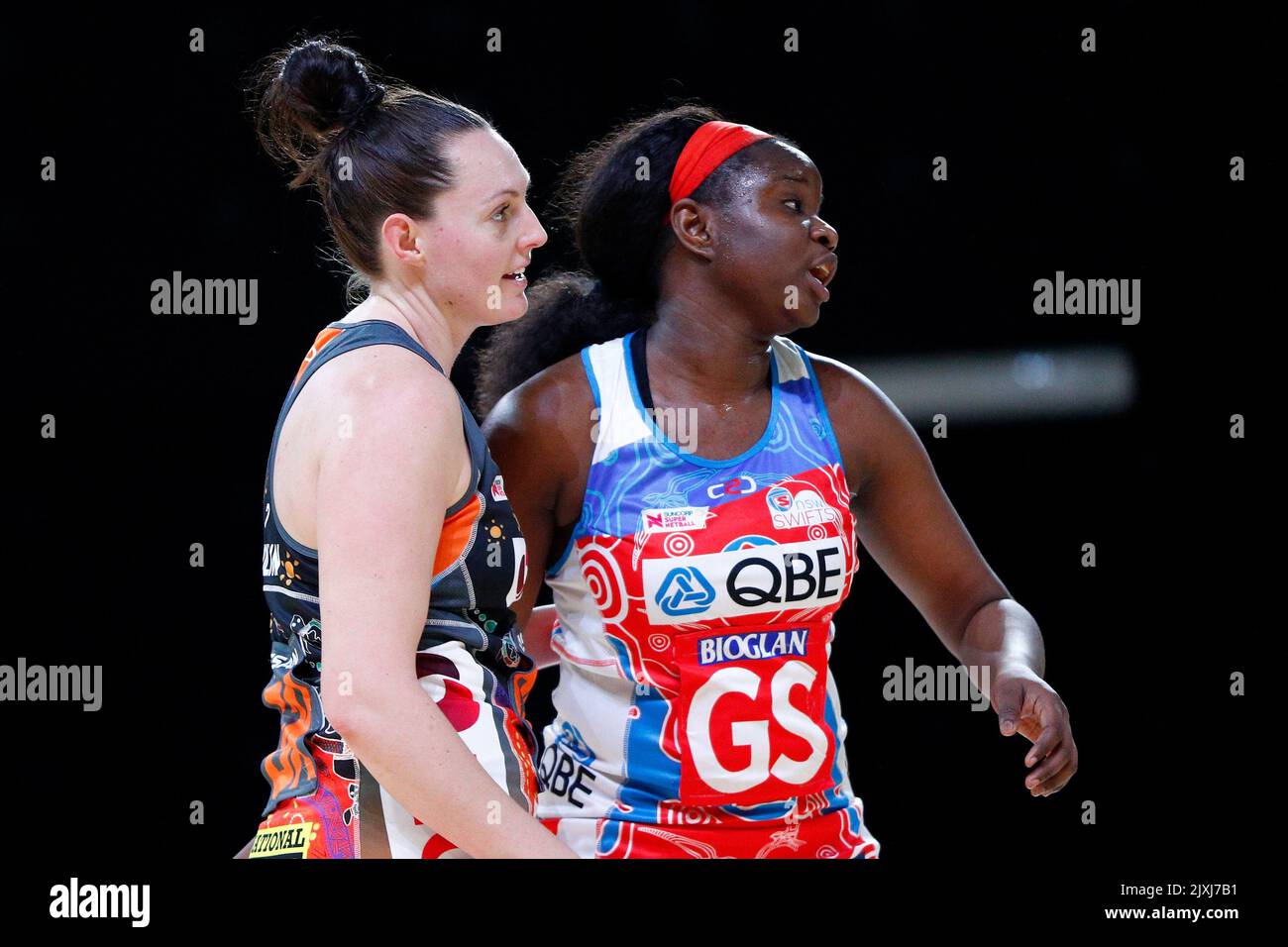 Sam Poolman of the Giants (left) and Sam Wallace of the Swifts react ...