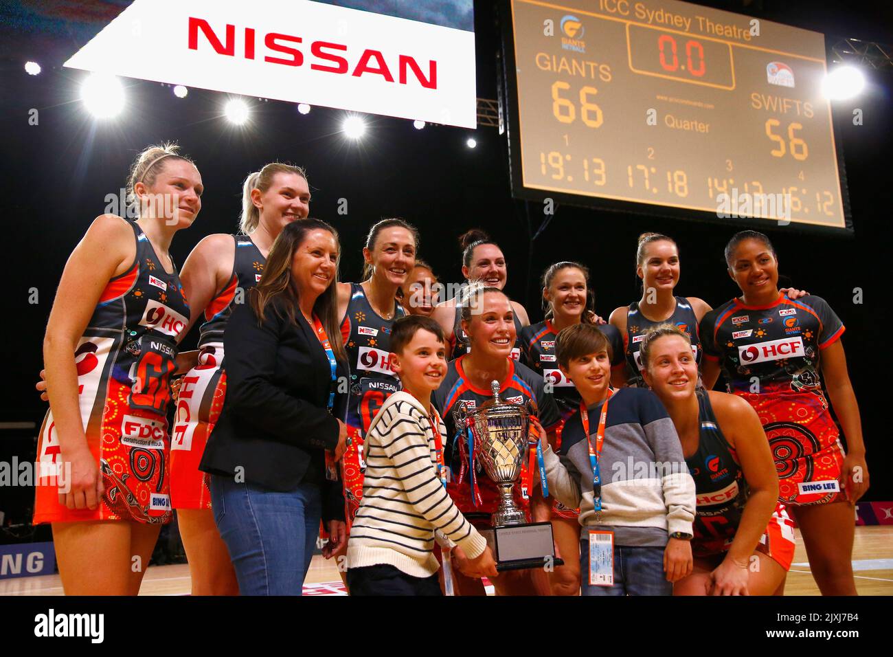 Giants players pose for a photograph with the Carol Sykes Memorial ...