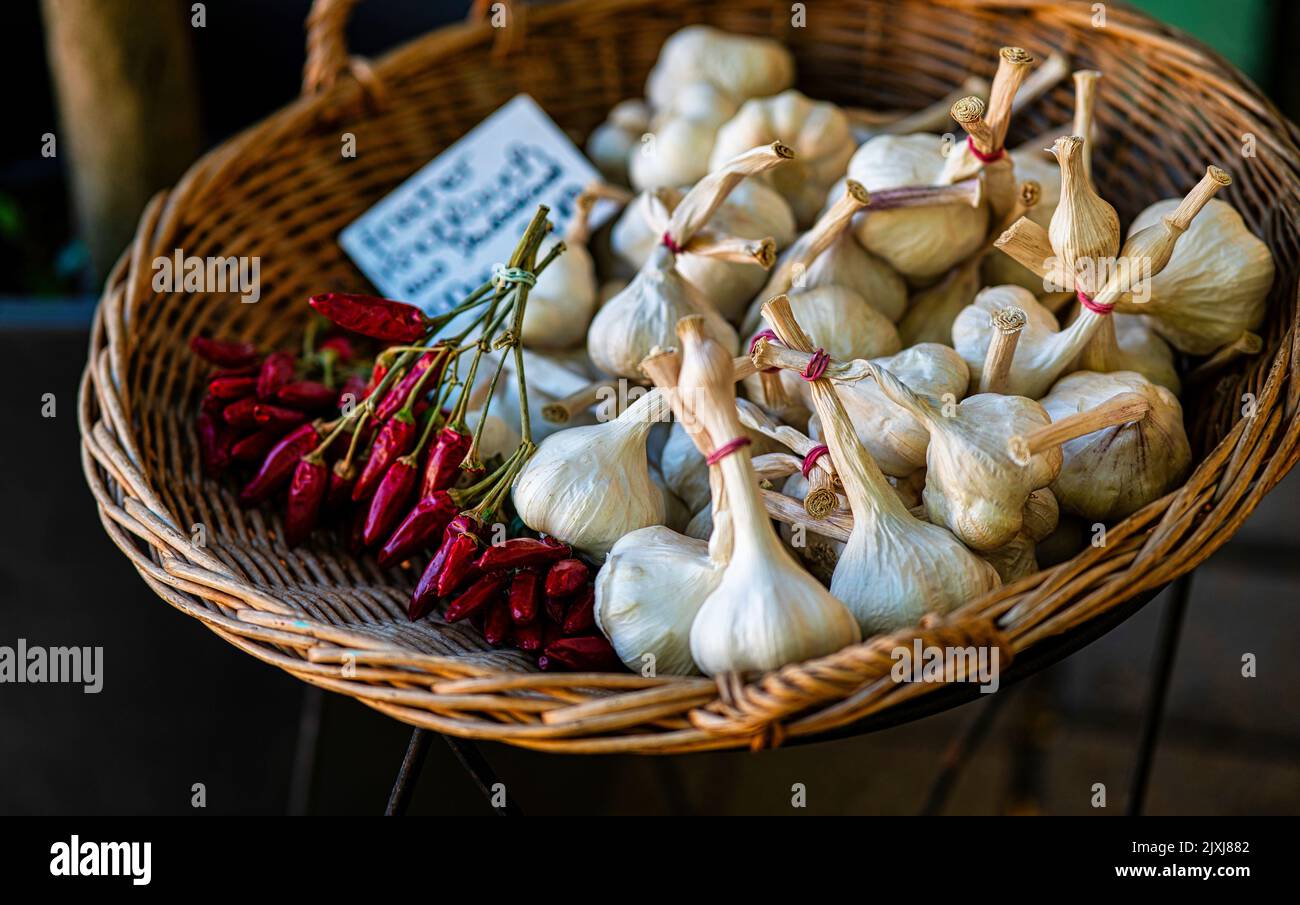 The red chili and garlic in basket displayed at famous marketplace ...