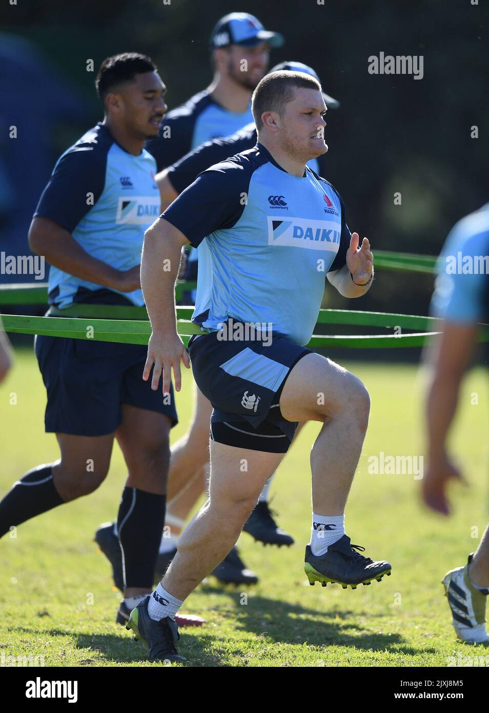 Tom Robertson of the Waratahs with his teammates during a training ...