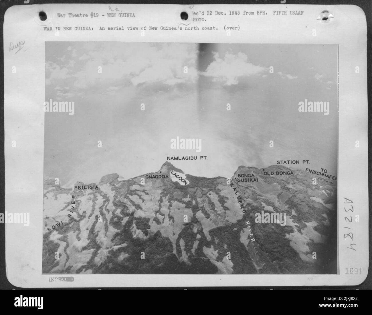 WAR IN NEW GUINEA: An aerial view of New Guinea's north coast where ...